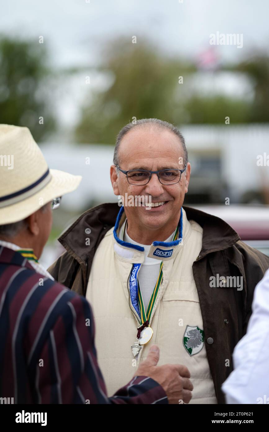 Theo Paphitis from TV Dragon's Den preparing to drive a classic racing ...