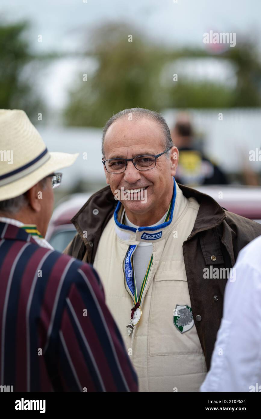 Theo Paphitis from TV Dragon's Den preparing to drive a classic racing ...