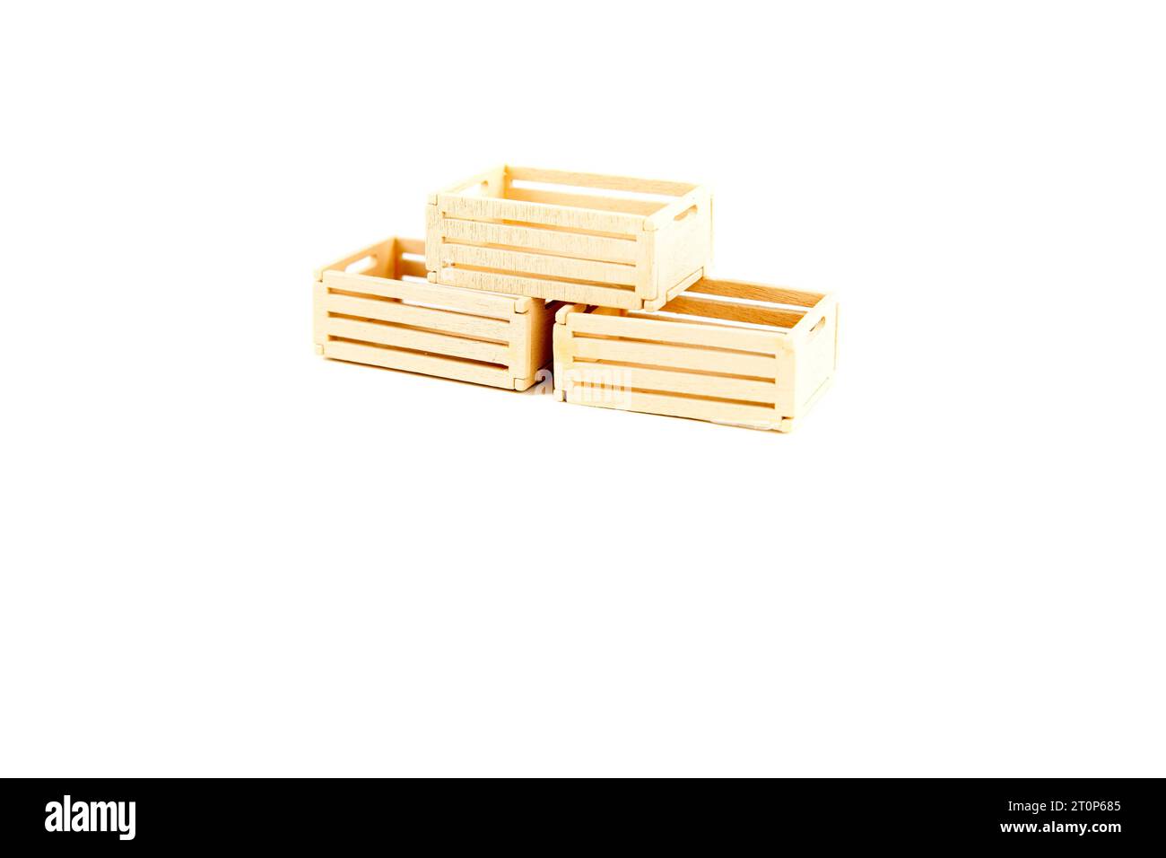 Three toy wooden apple boxes stacked up side view Stock Photo - Alamy