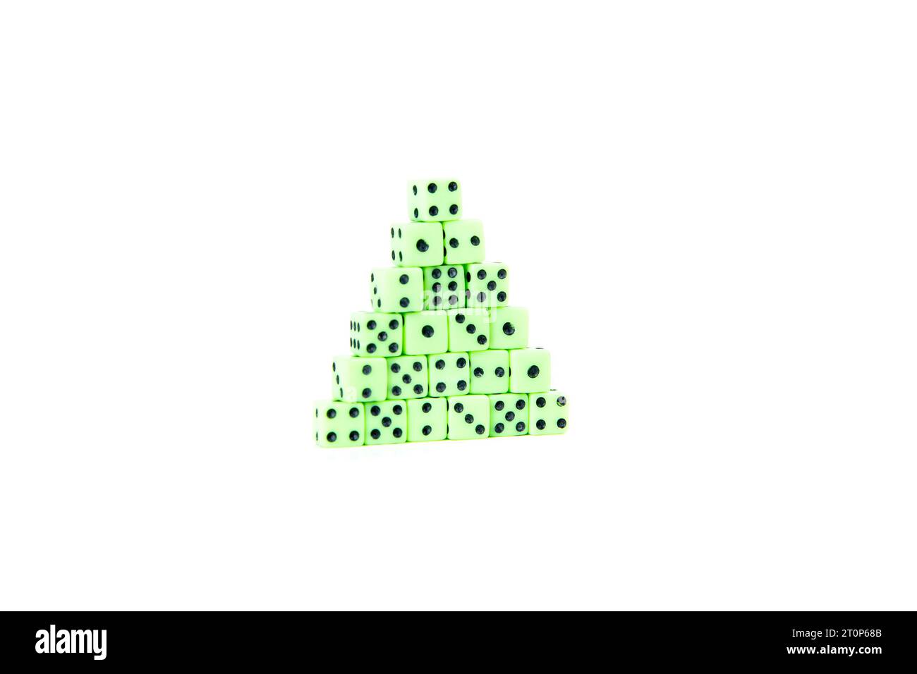 Pyramid of tiny neon green dice stacked over white side view Stock ...