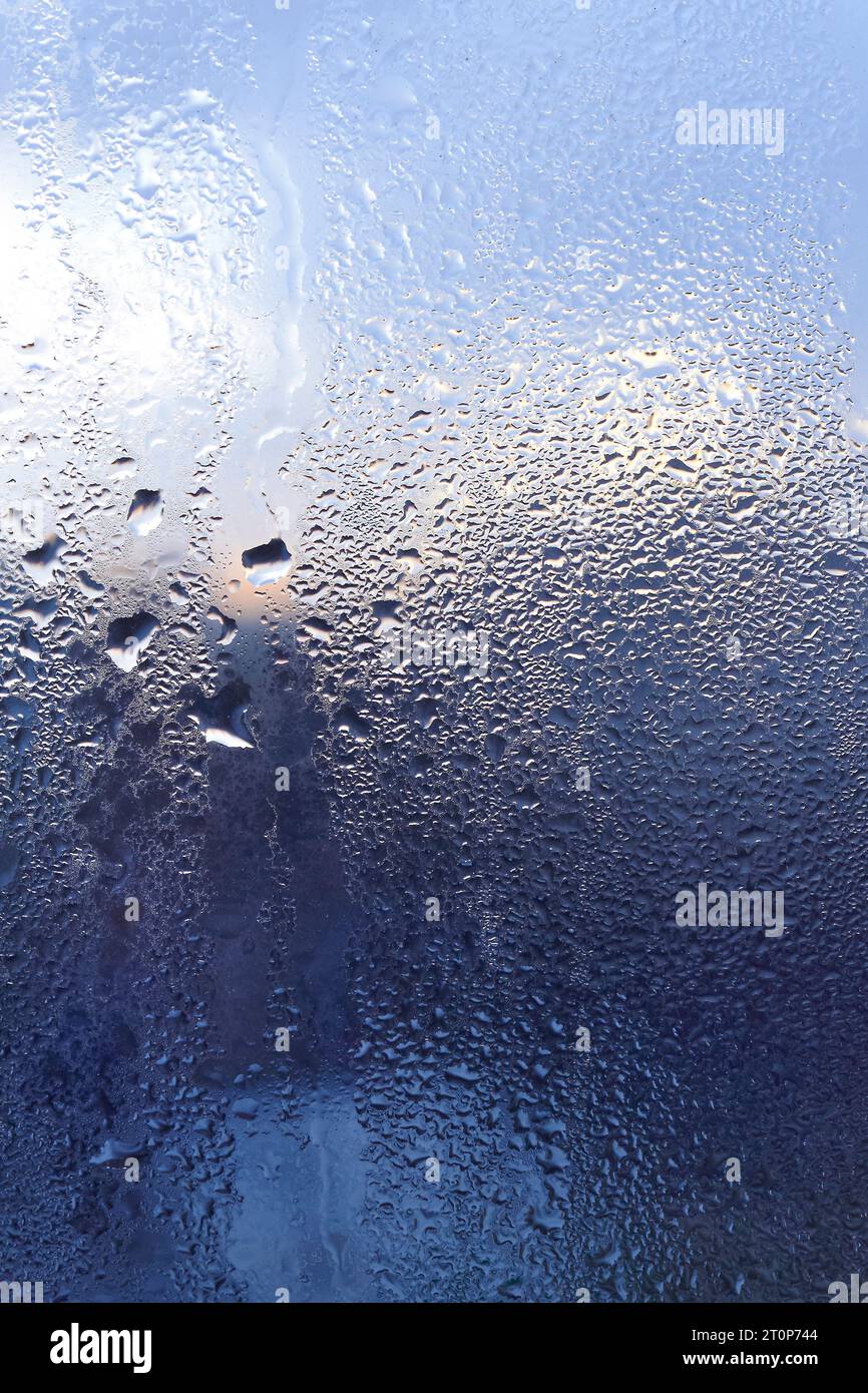 Natural water drops and sunlight on window glass Stock Photo - Alamy
