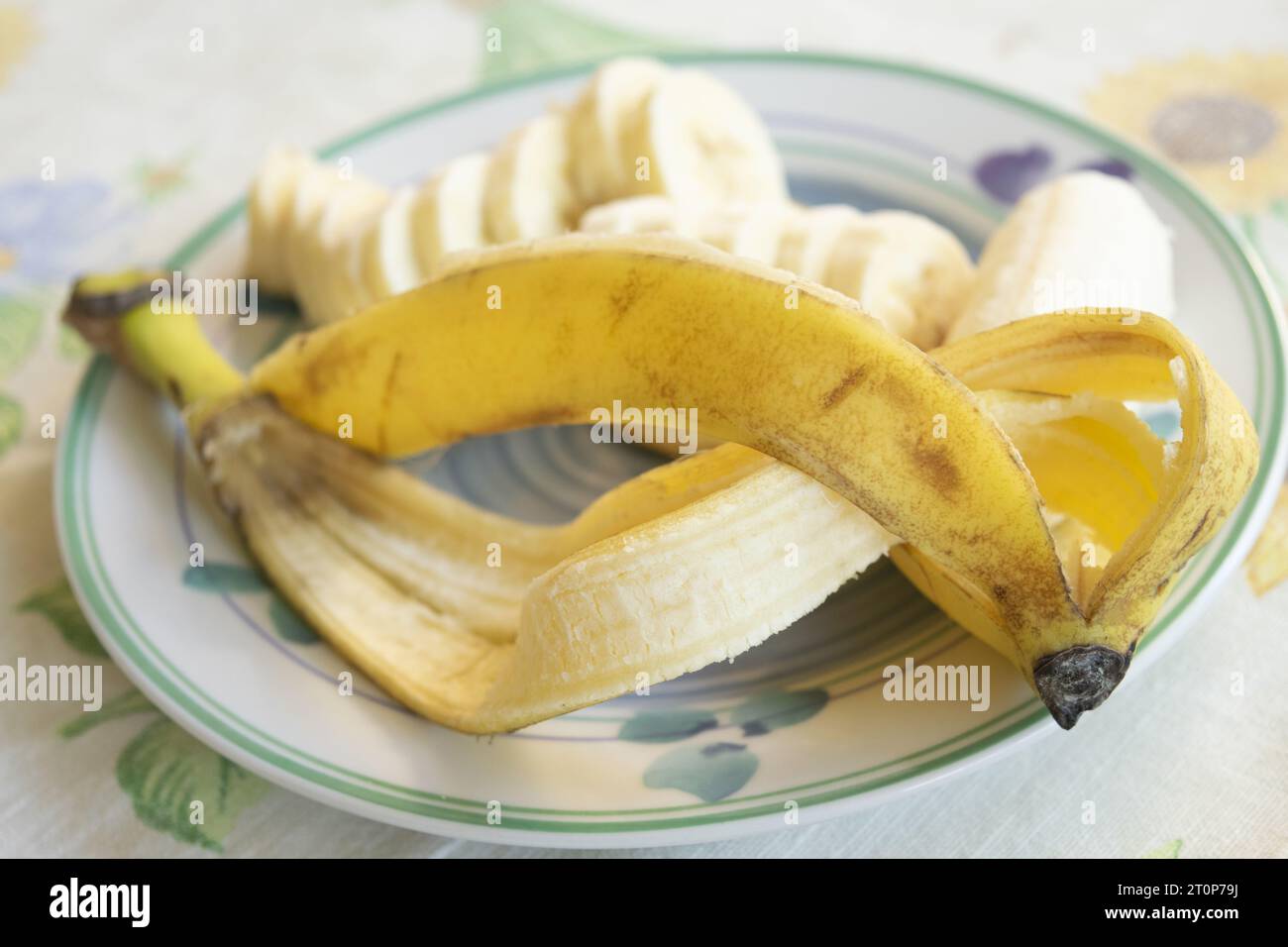 banana peeled and cut into slices Stock Photo - Alamy