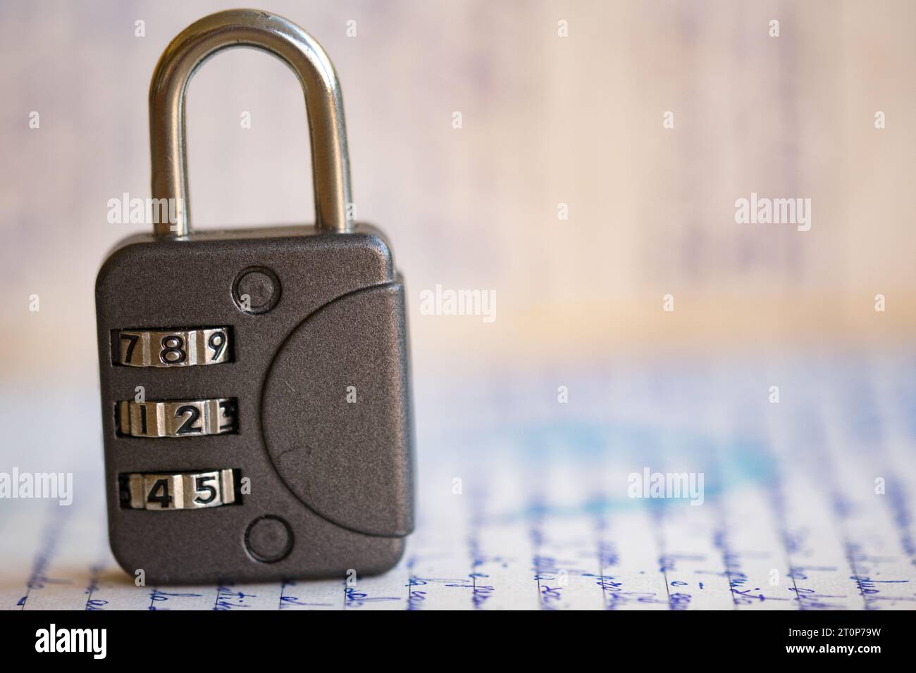 combination lock placed over a manuscript Stock Photo - Alamy