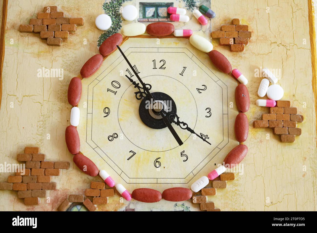 health over time with a clock built with pills Stock Photo - Alamy