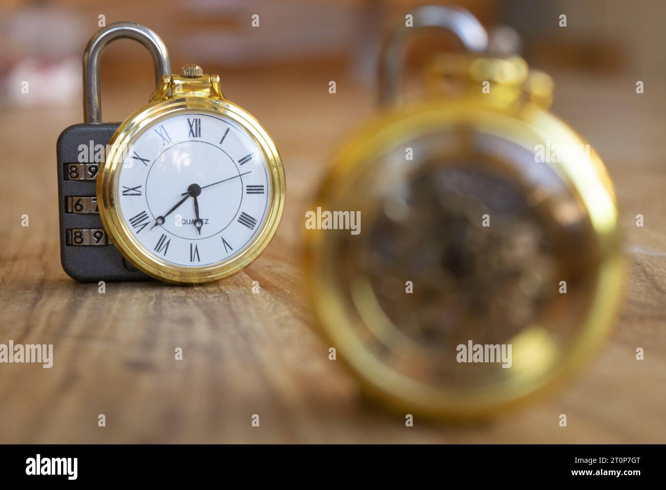 time concept with two old pocket watch and a combination lock Stock ...