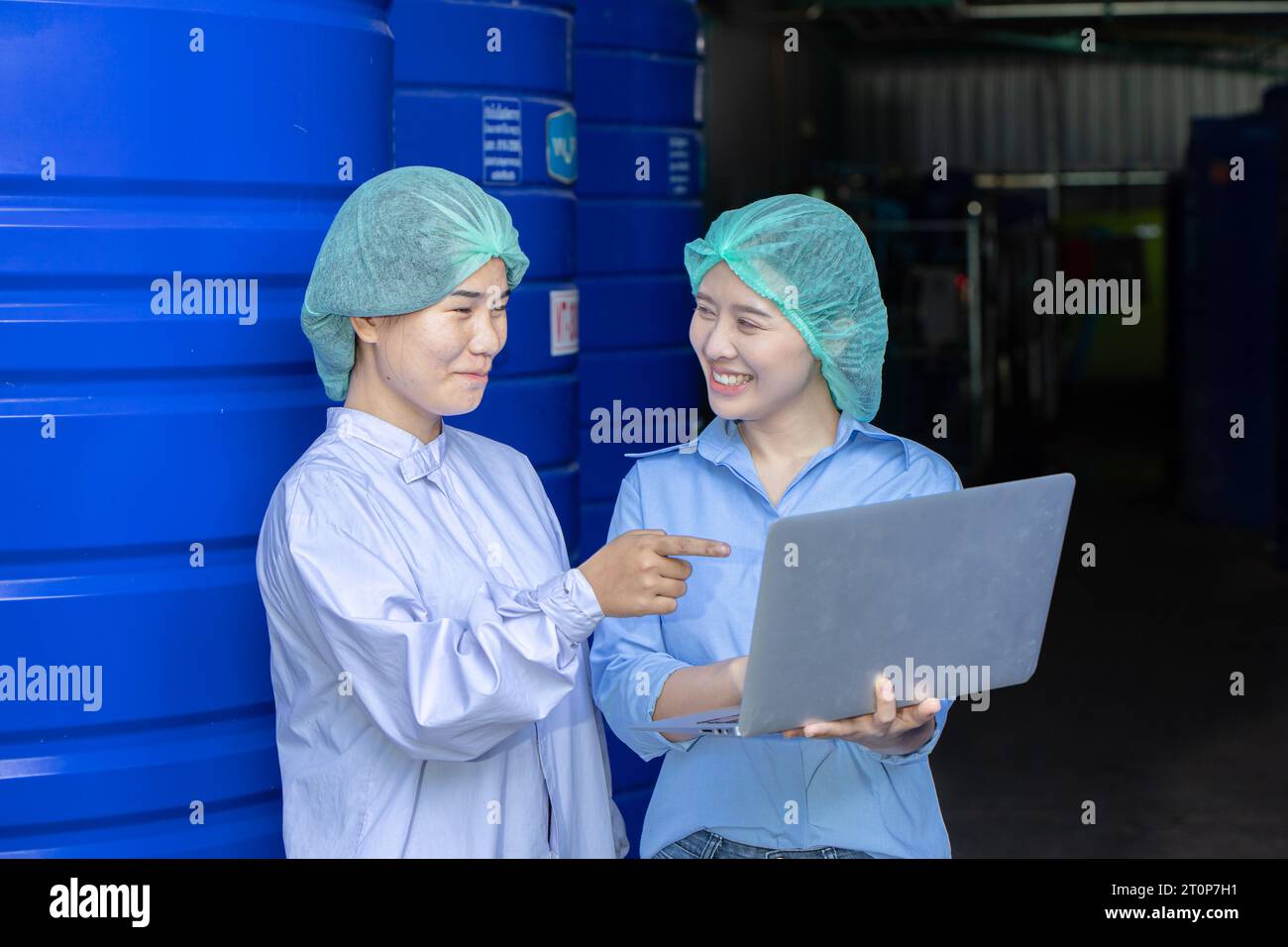 Water quality control officer engineer team inspect water tanks in ...