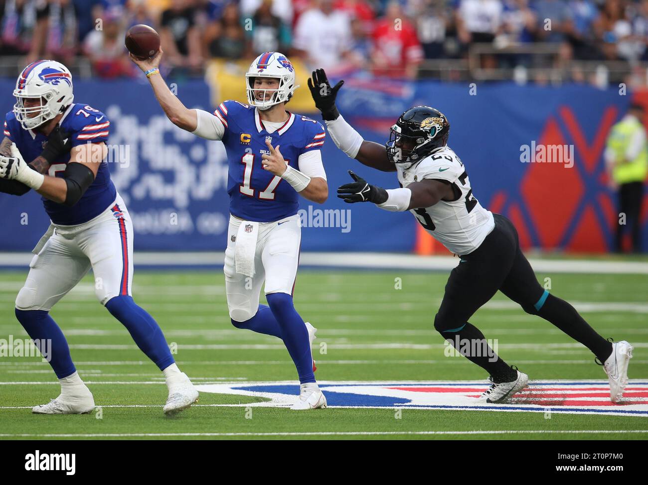 Buffalo Bills Josh Allen throws the ball under pressure during the NFL ...