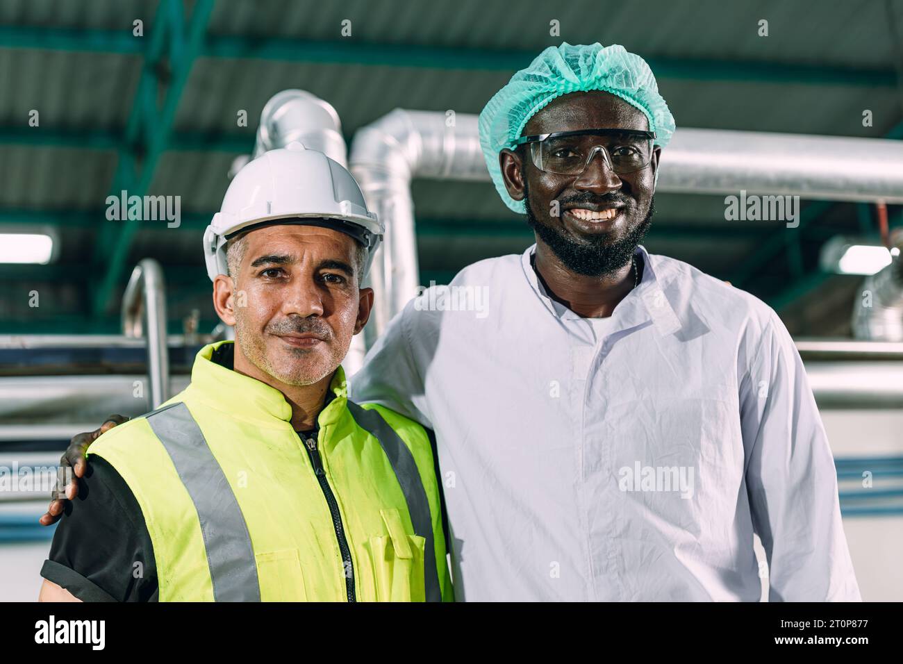 Portrait happy senior engineer with hygiene black african male worker ...