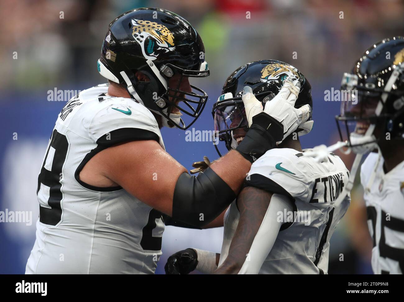 Jacksonville Jaguars' Travis Etienne jr (right) celebrates scoring his ...