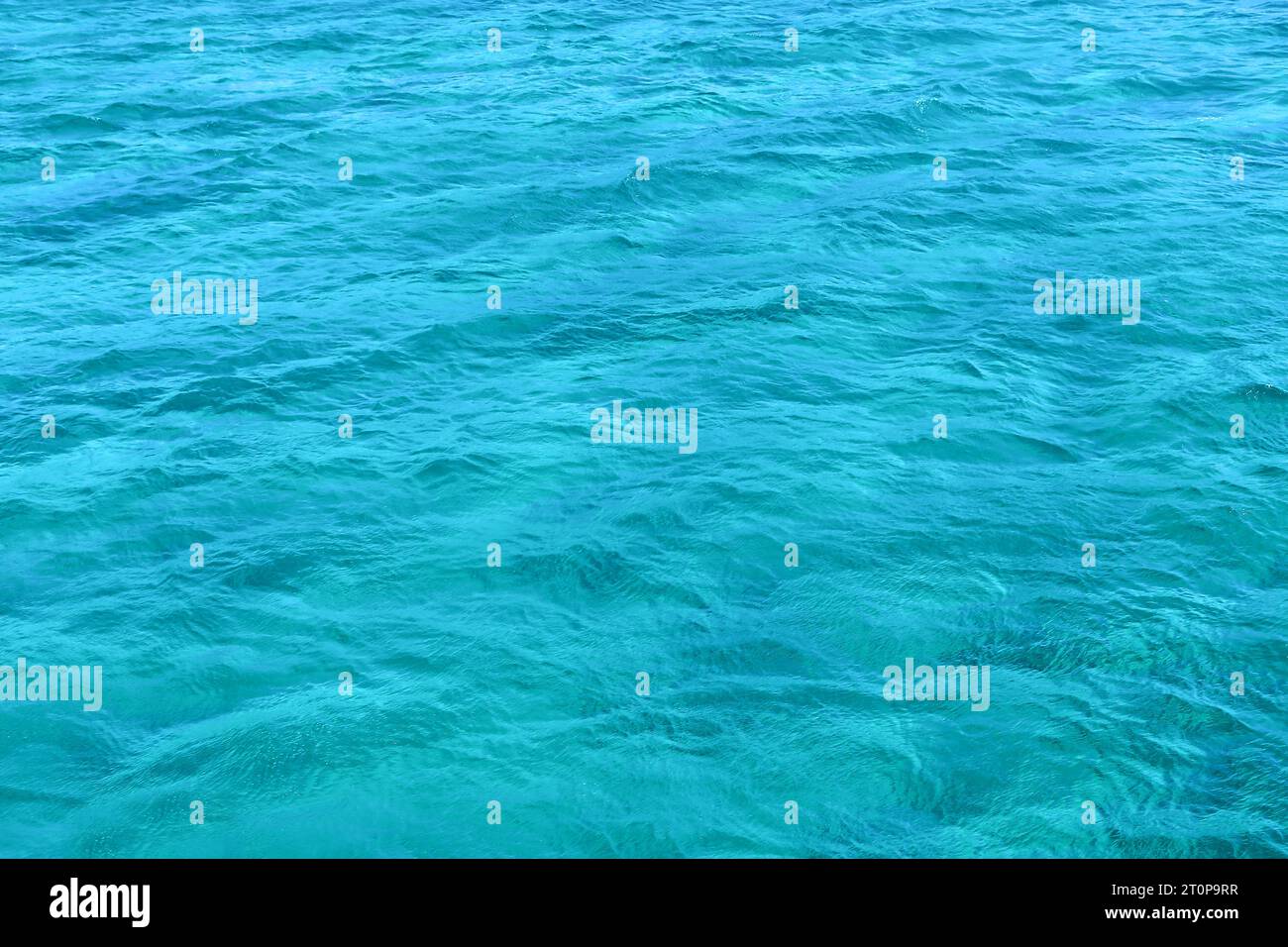 Bright sea water background Stock Photo - Alamy