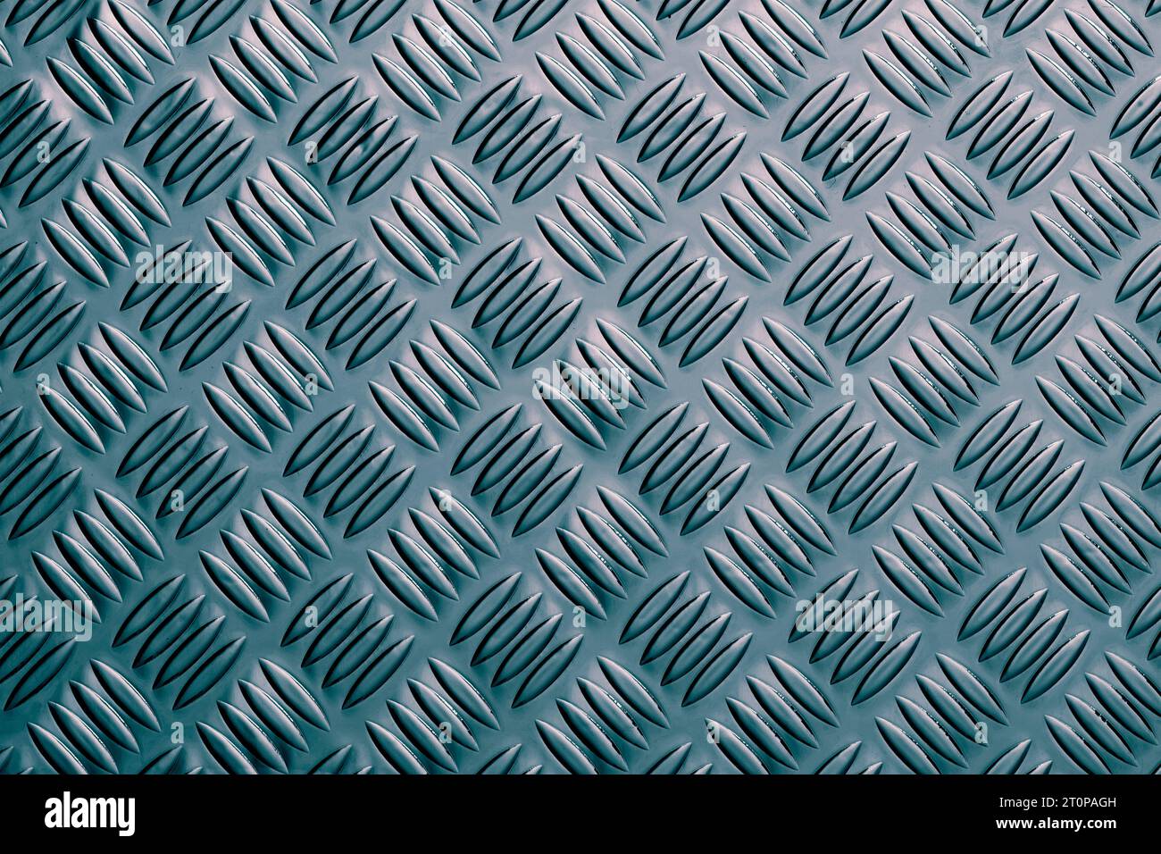 Close-up of a sheet of aluminium checker plate. Industrial material ...