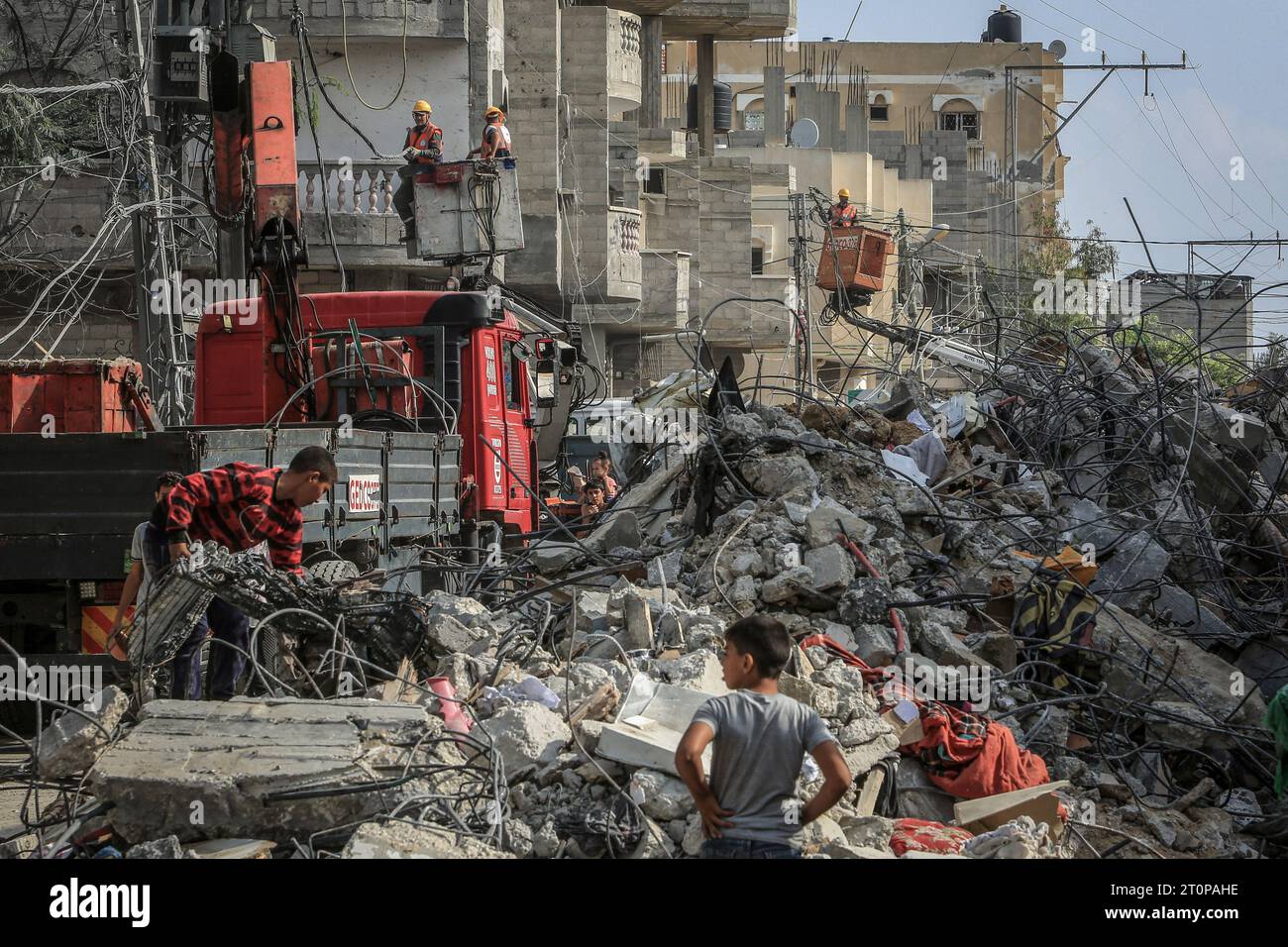 Rafah, Palestinian Territories. 08th Oct, 2023. Palestinians inspect ...