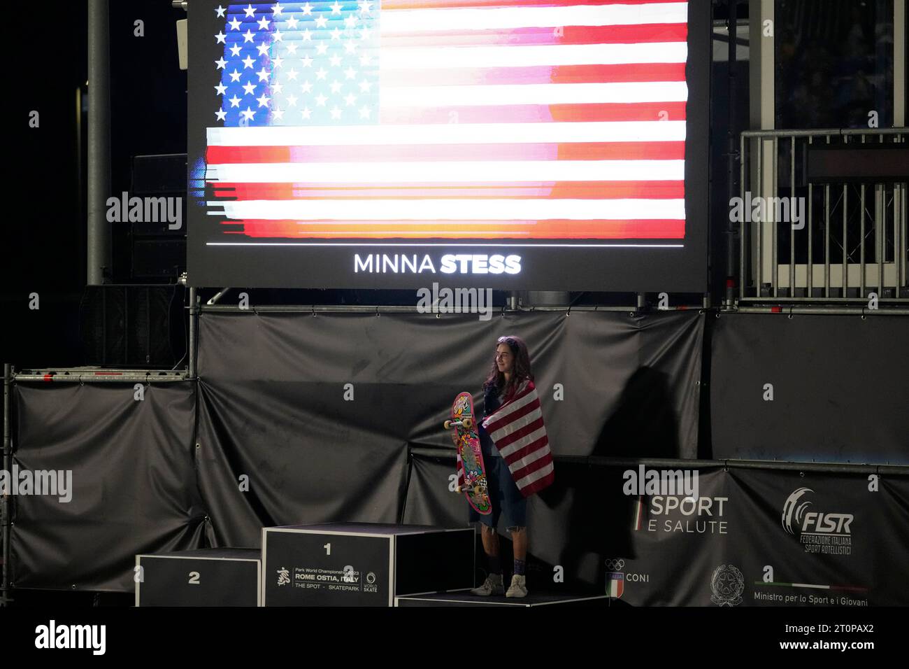 Minna Stess of the United States stands on the podium after winning the ...