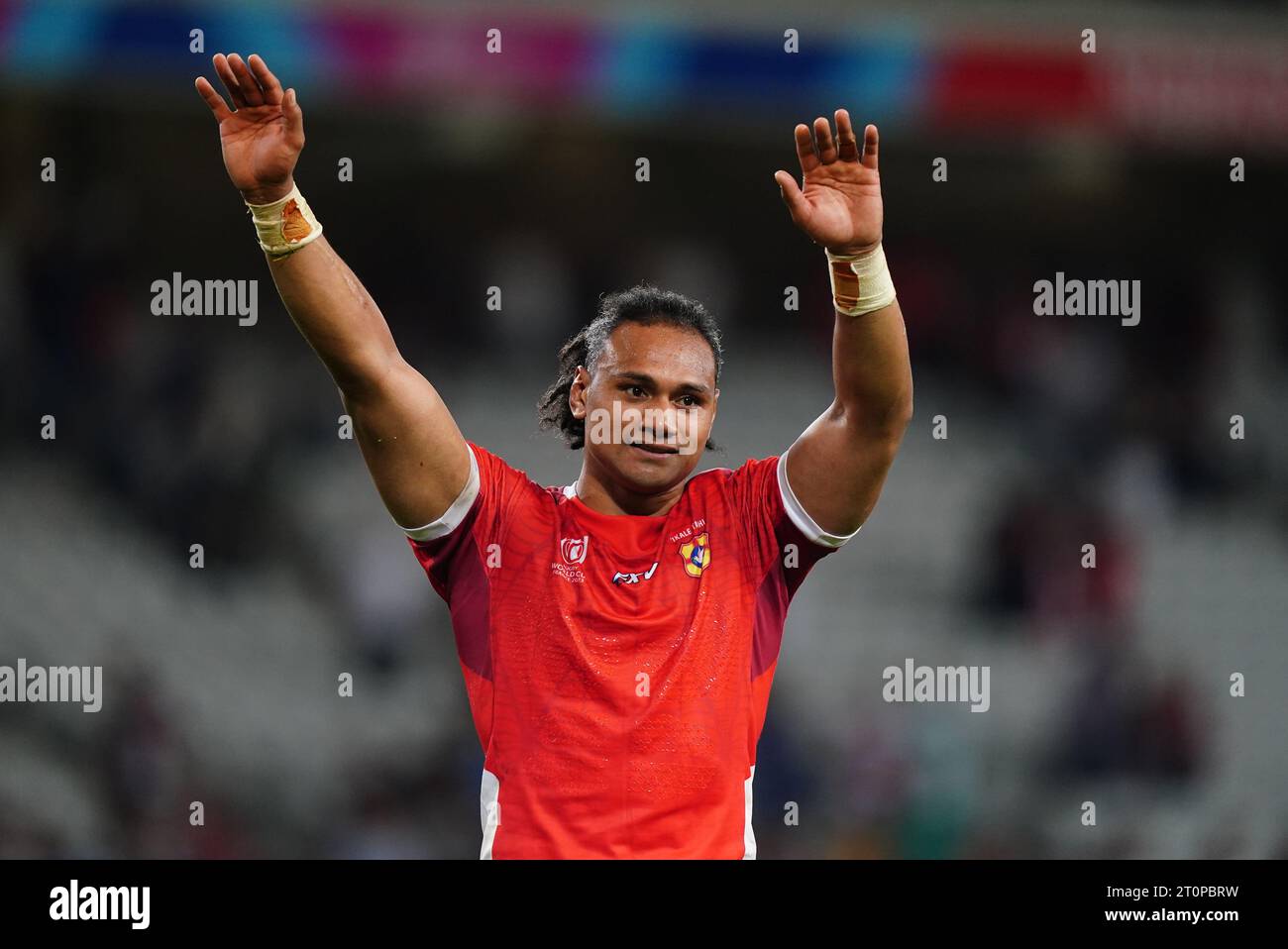 Tonga's Penitoa Finau during a lap of honour after the Rugby World Cup ...