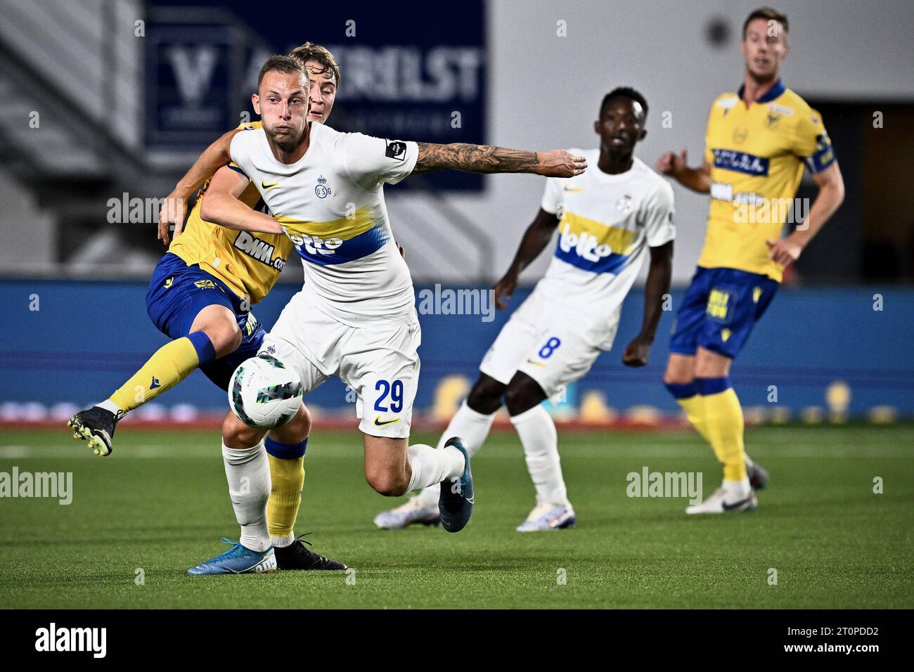 Sint Truiden, Belgium. 08th Oct, 2023. Union's Gustaf Nilsson and STVV ...
