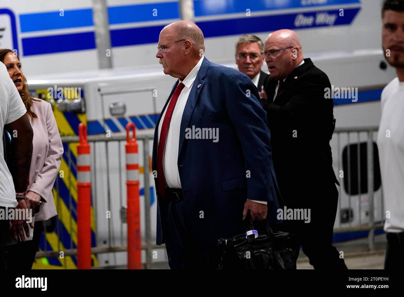 Kansas City Chiefs head coach Andy Reid, center, arrives at U.S. Bank ...
