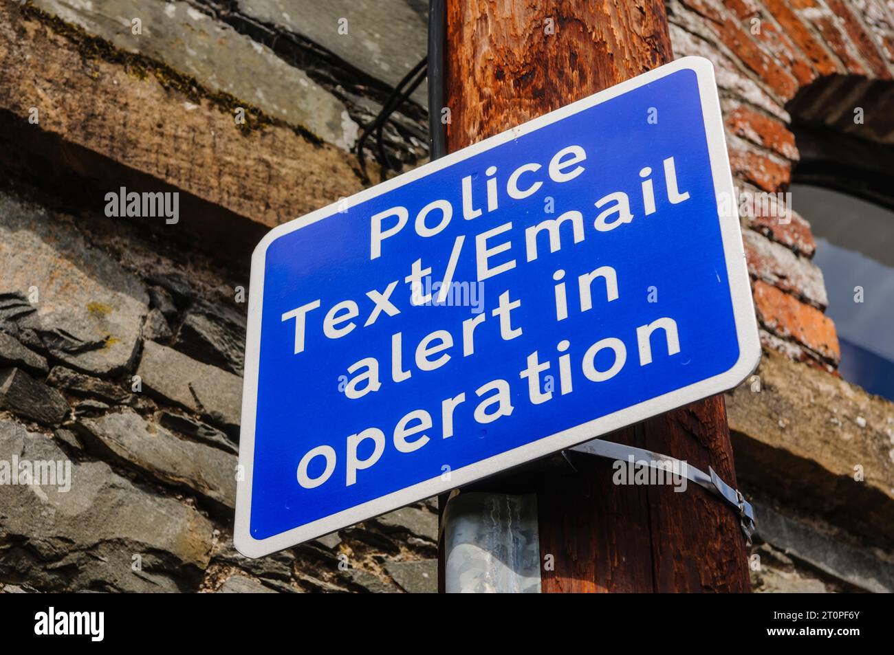 Sign warning public that "Police Text/Email alert in operation Stock ...