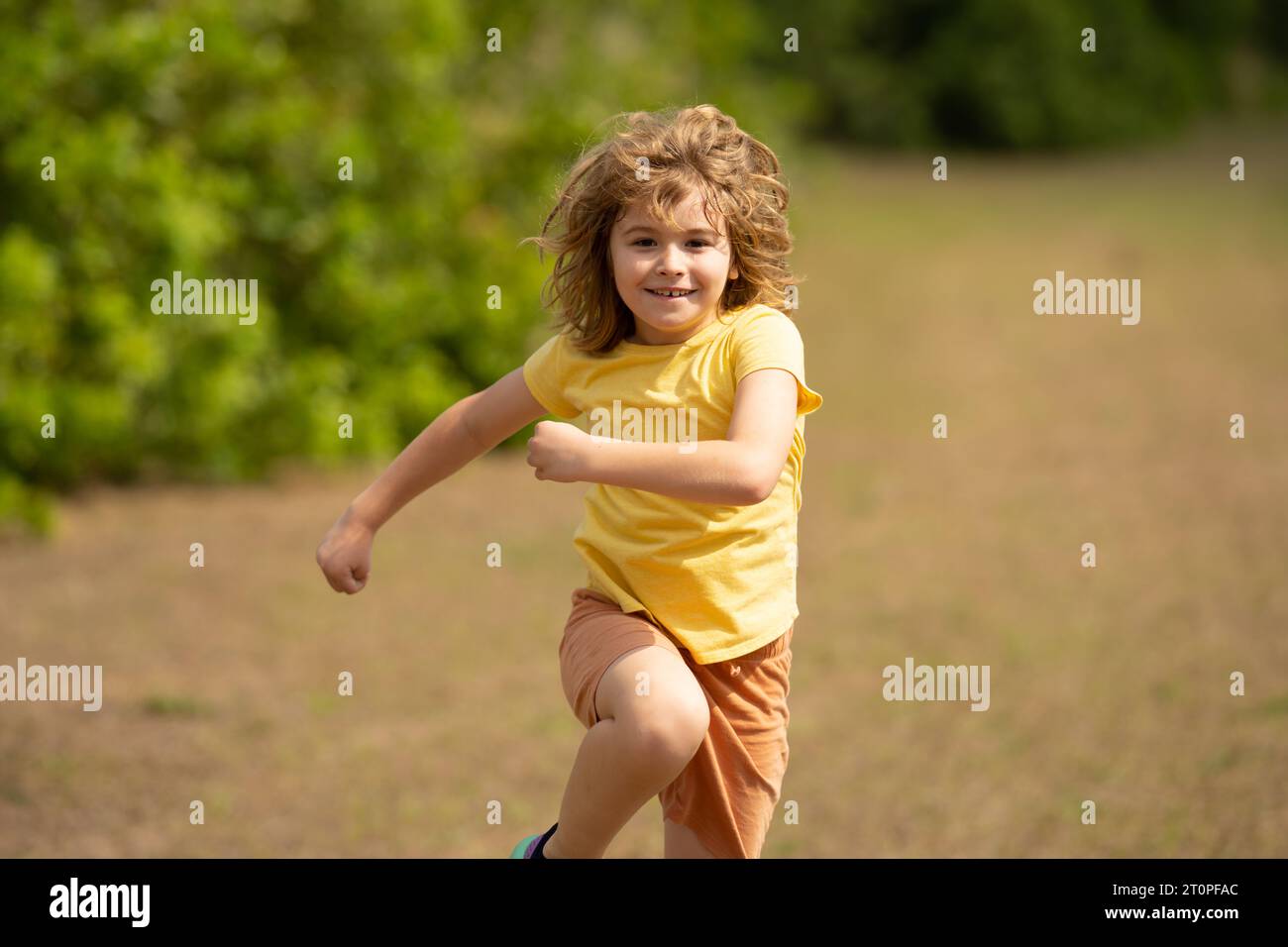 Kid running in summer street. Child enjoy run. Little boy running on ...