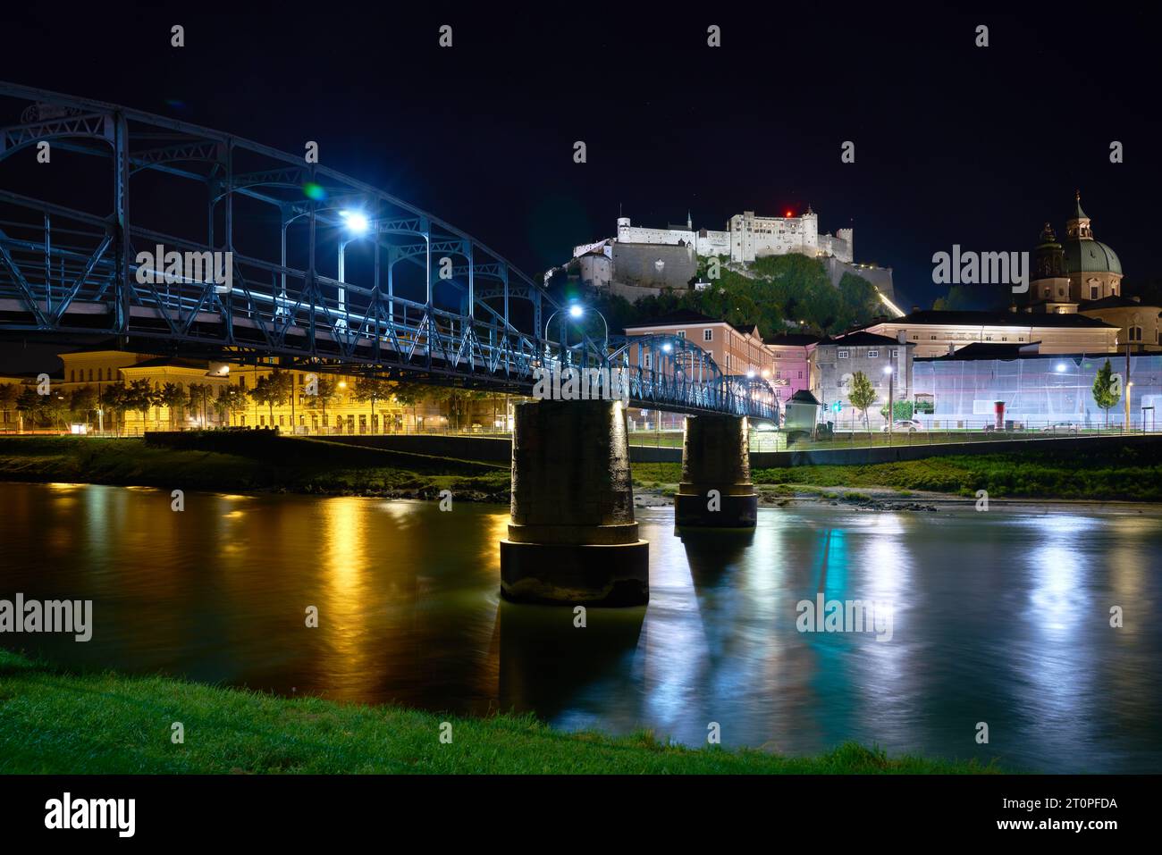 The Mozartsteg Bridge in Salzburg at Night. A night view of Salzburg ...