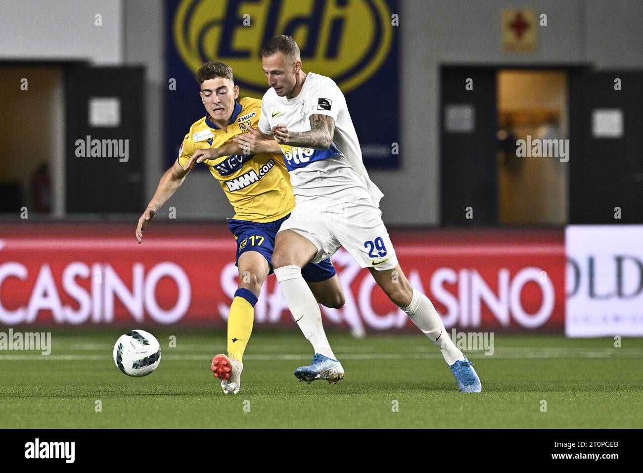Sint Truiden, Belgium. 08th Oct, 2023. STVV's Mathias Delorge and Union ...