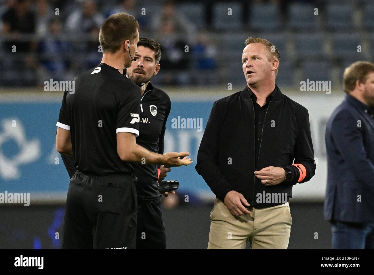 Gent, Belgium. 08th Oct, 2023. referee Jasper Vergoote and Genk's head ...