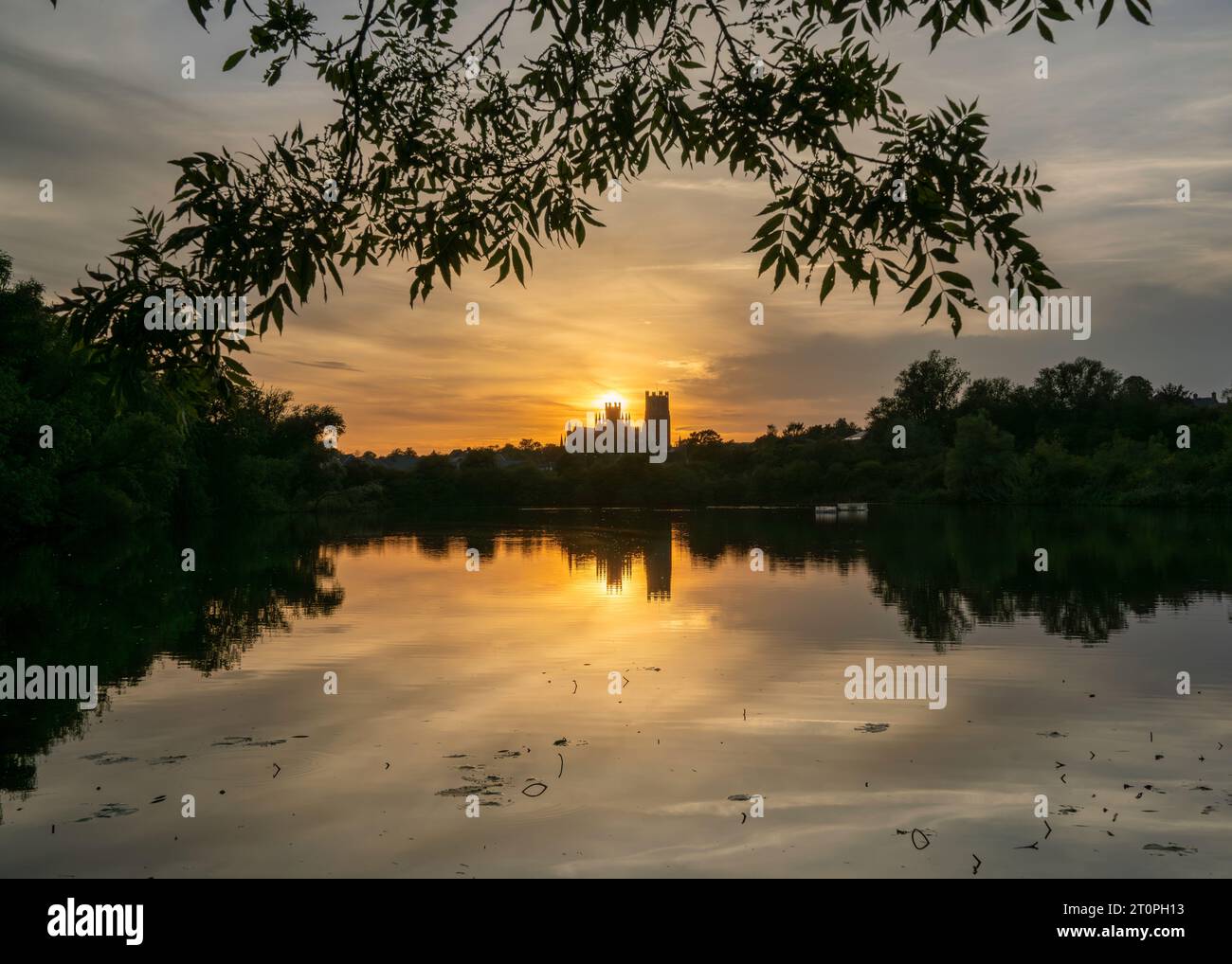 Sunset behind Ely Cathedral, from Roswell Pits Nature Reserve Stock ...