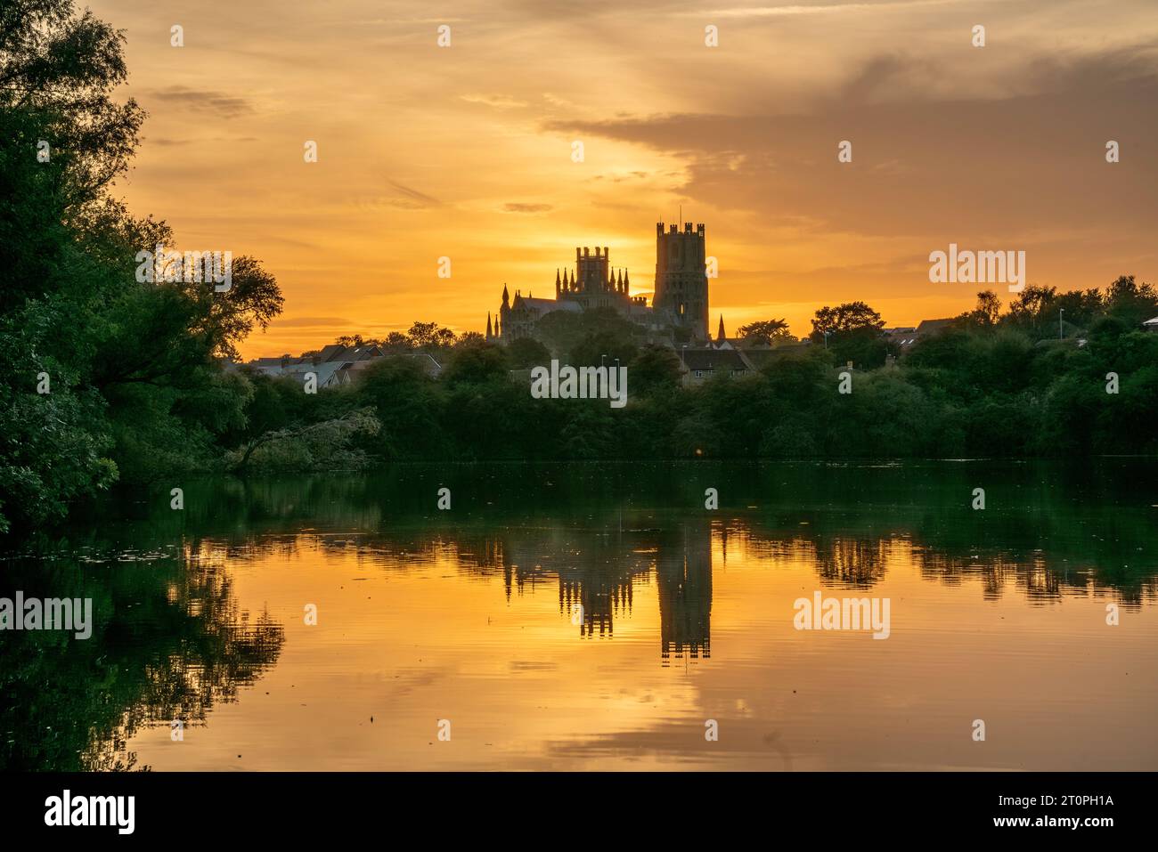 Sunset behind Ely Cathedral, from Roswell Pits Nature Reserve Stock ...