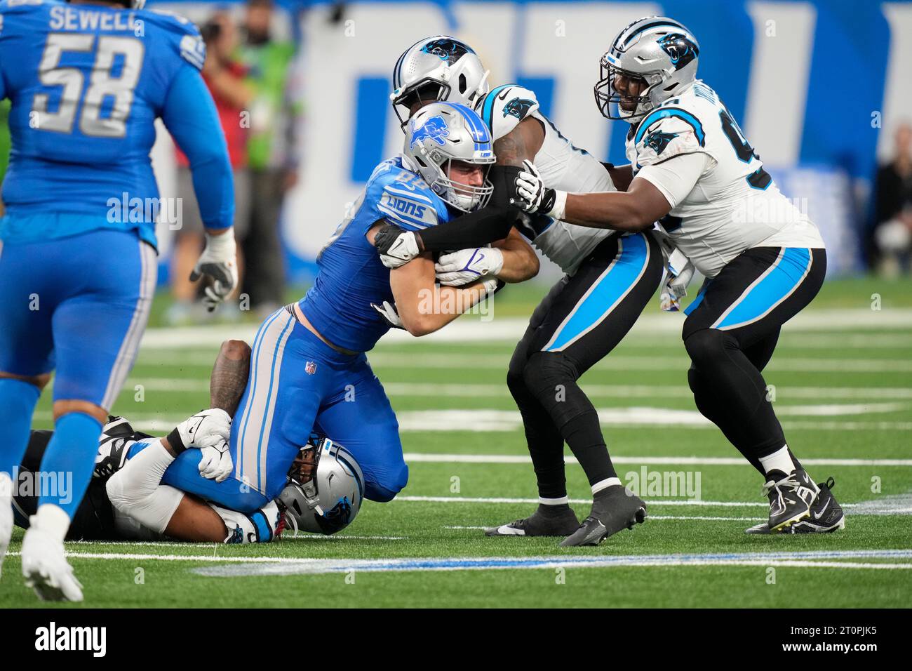 Detroit Lions tight end Brock Wright (89) is tackled by Carolina ...