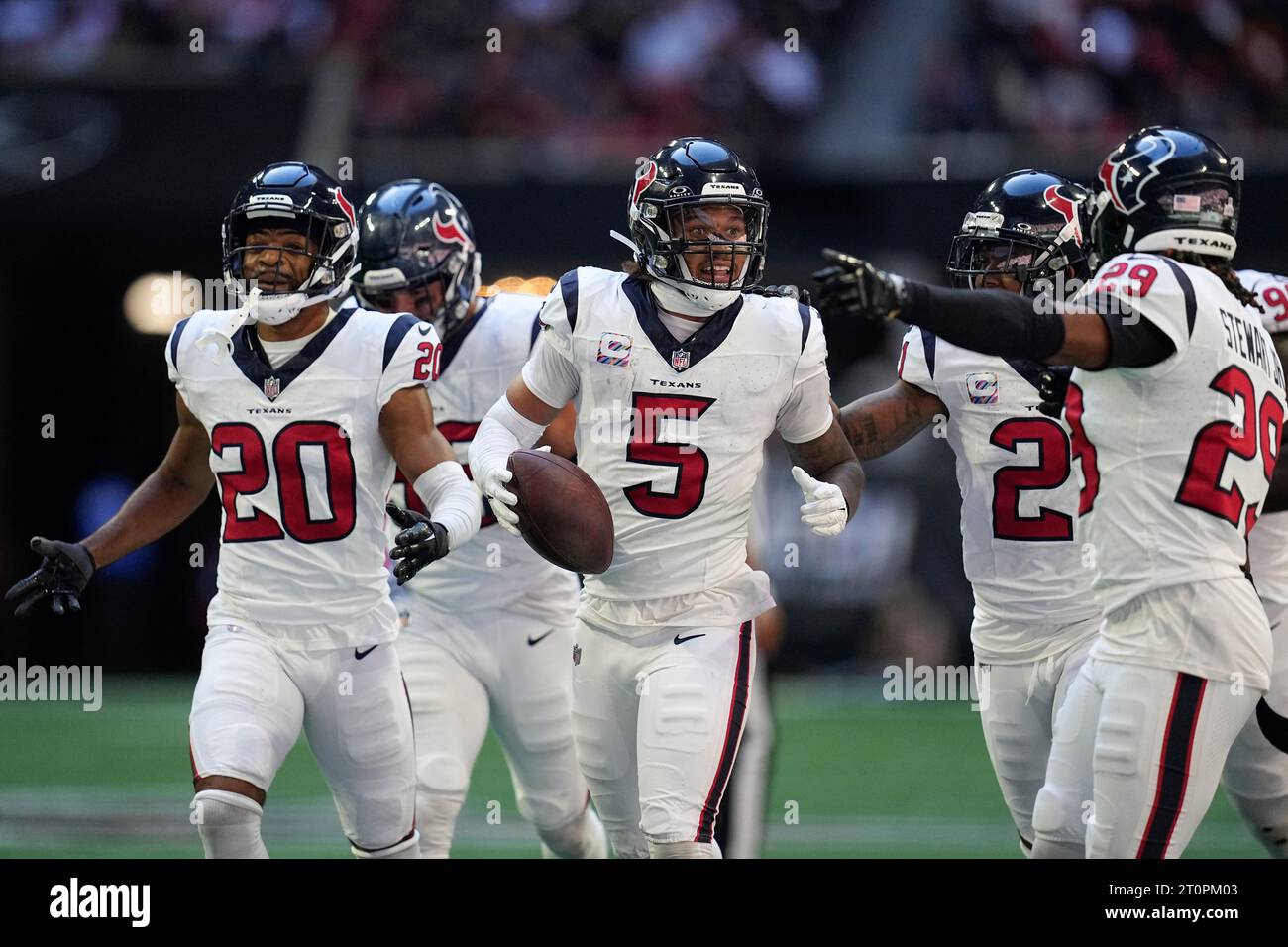 Houston Texans safety Jalen Pitre, center, celebrates a fumble recovery ...