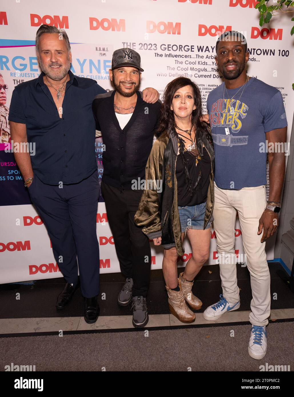 Scott Buccheit, guest, guest, Naeem Delbridge attends the party for ...