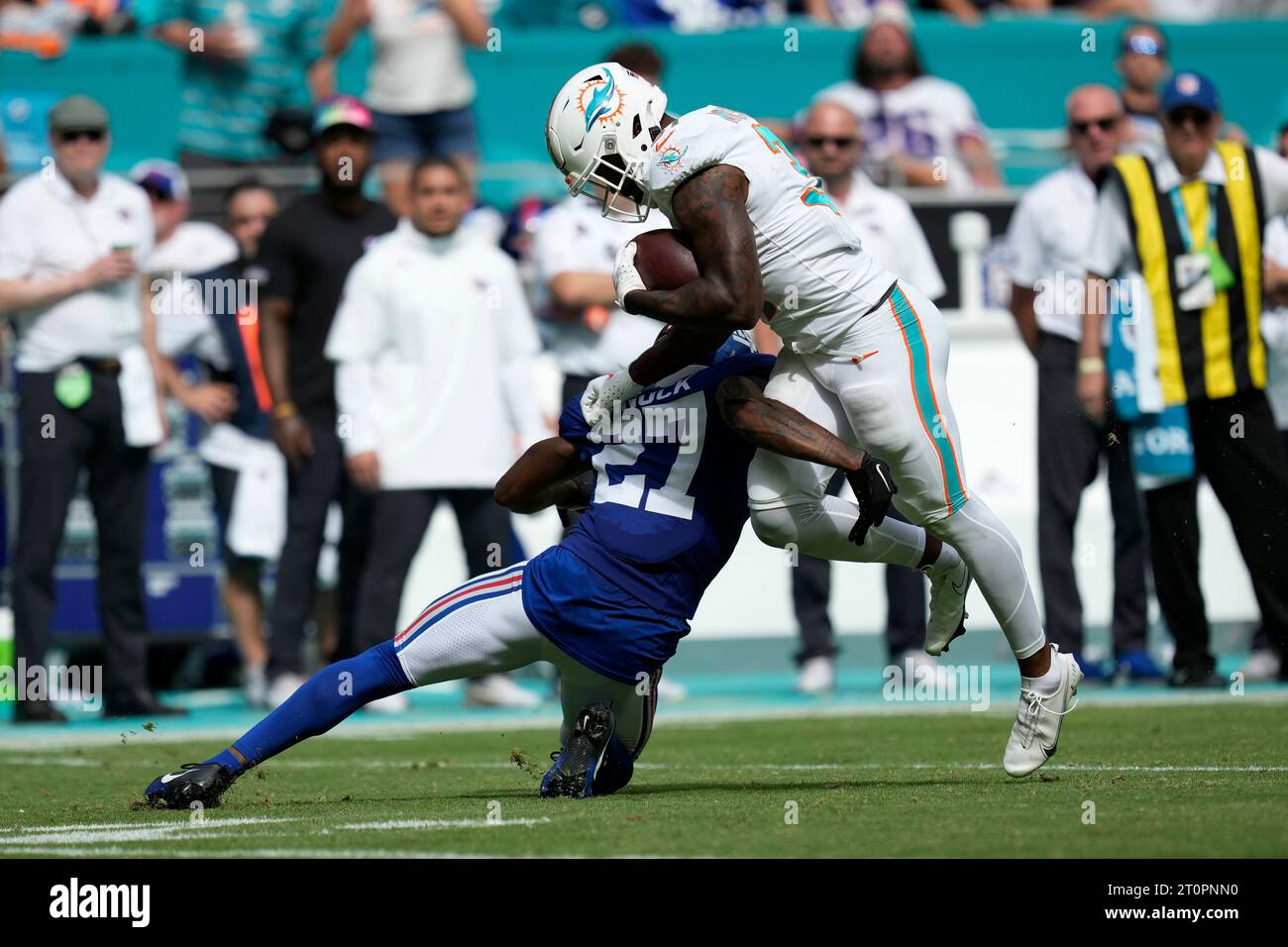New York Giants safety Jason Pinnock (27) grabs Miami Dolphins running ...