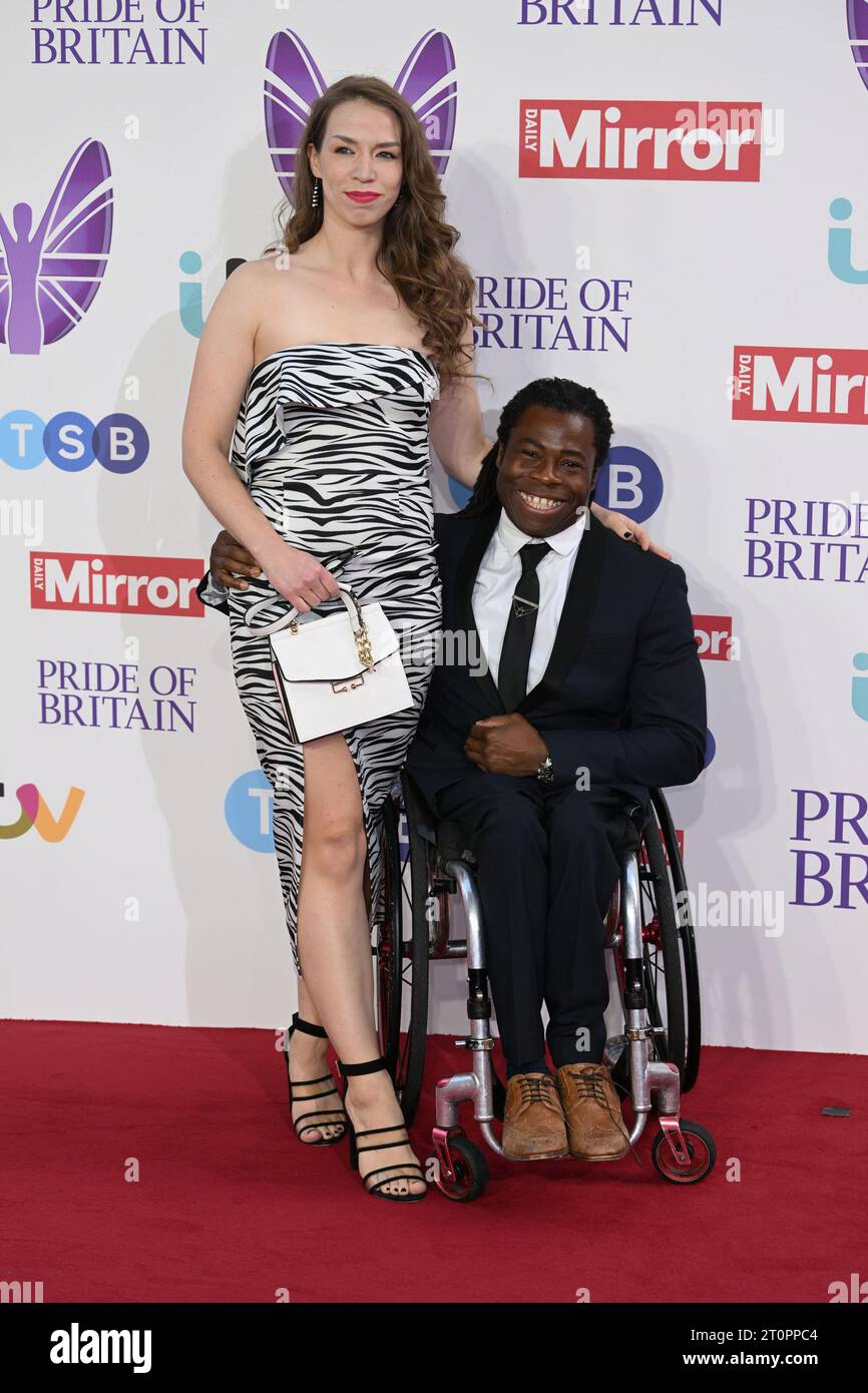 Ade Adepitan and guest arrive for the Pride of Britain Awards at the ...