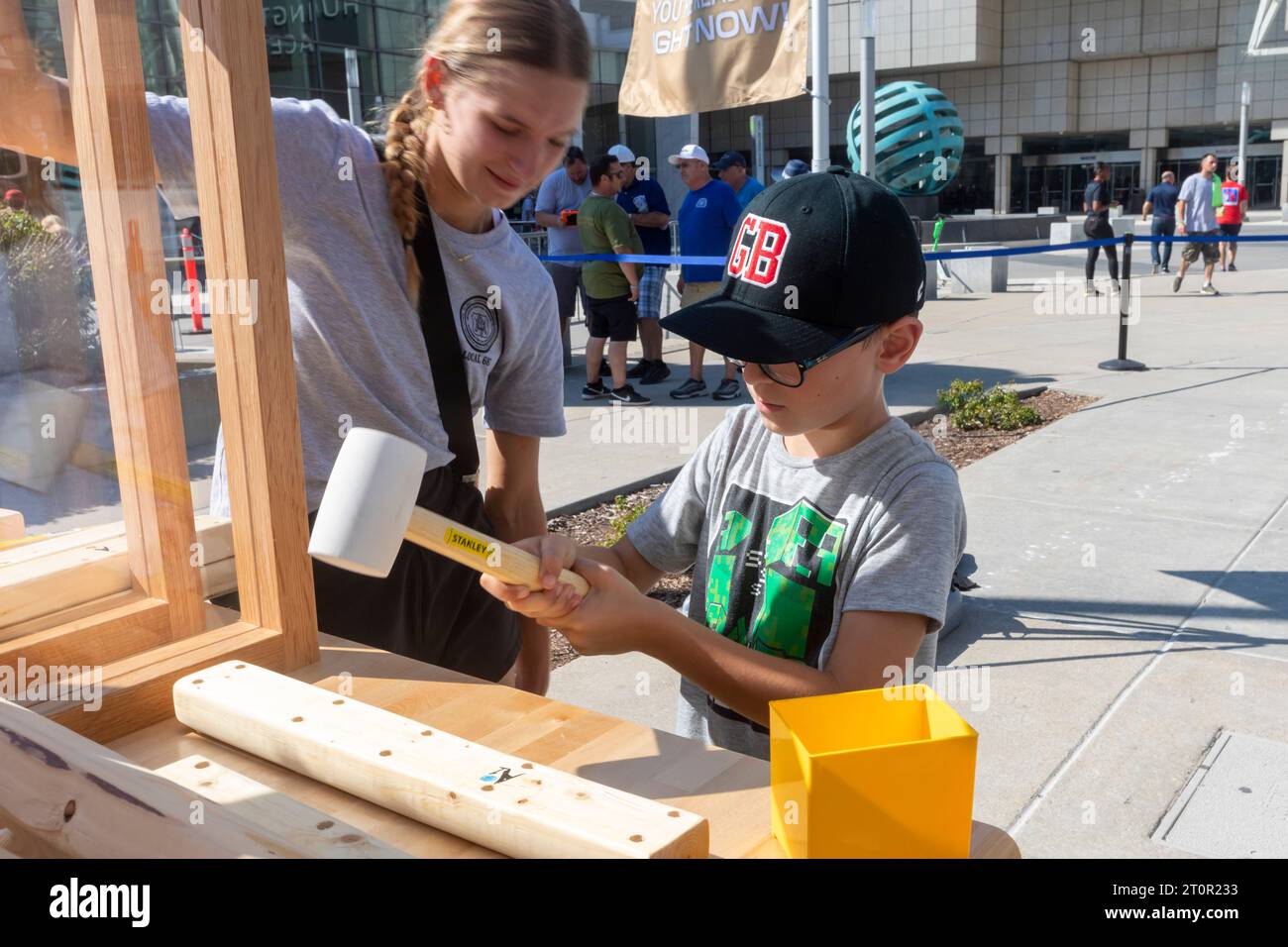 Detroit, Michigan - Silas Houle, 8, puts together pieces of a tiny ...