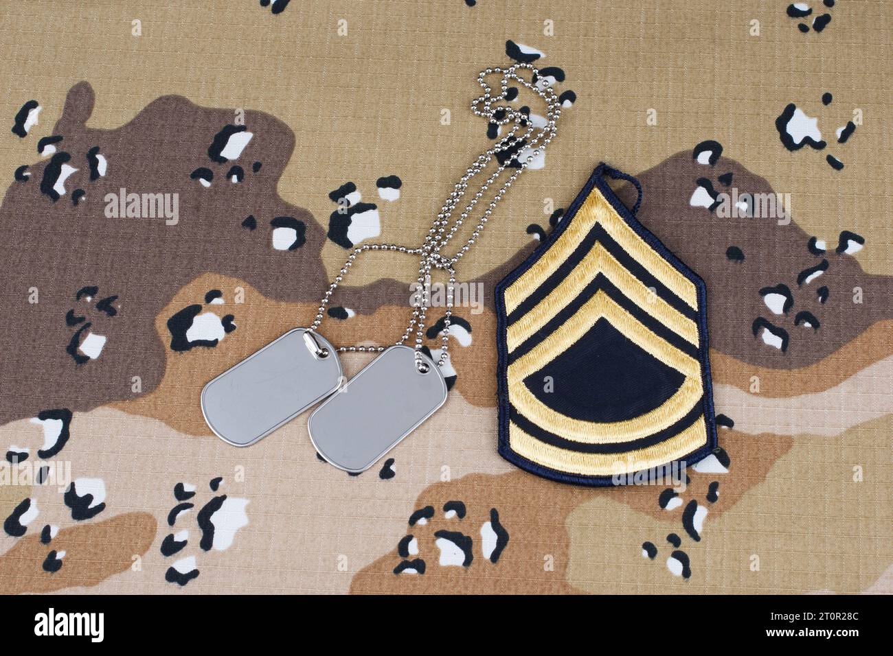 US ARMY Sergeant First Class rank patch and dog tags on Desert Battle ...