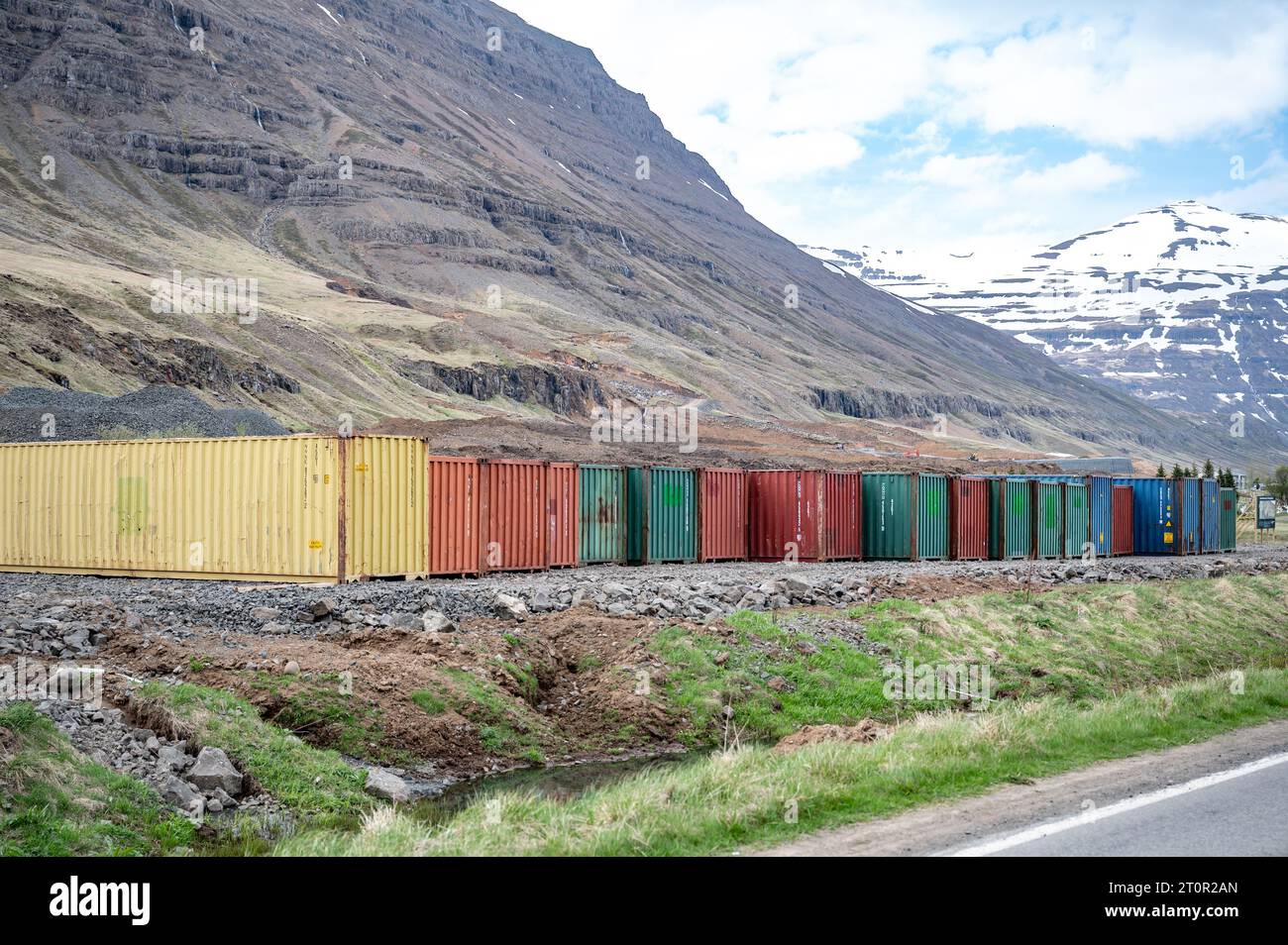 Colorful export import shipping cargo container standing next to each ...