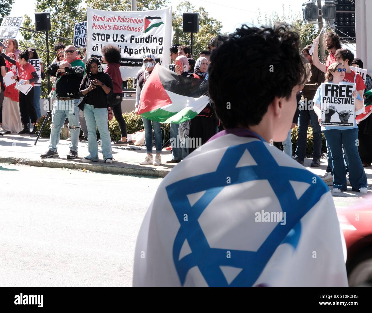 Atlanta, Georgia, USA. 8th Oct, 2023. A counter-protester draped in an ...
