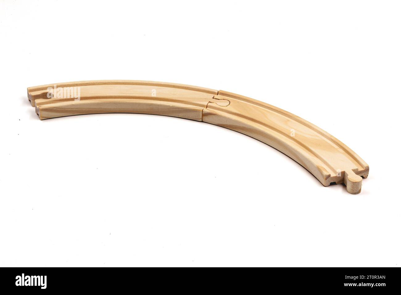 Wooden rail elements for children's train games on white background. Ecological toys. Photo in ...