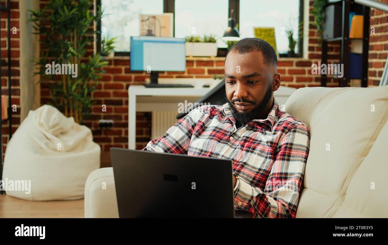 Teleworker checking emails on hi-res stock photography and images - Alamy
