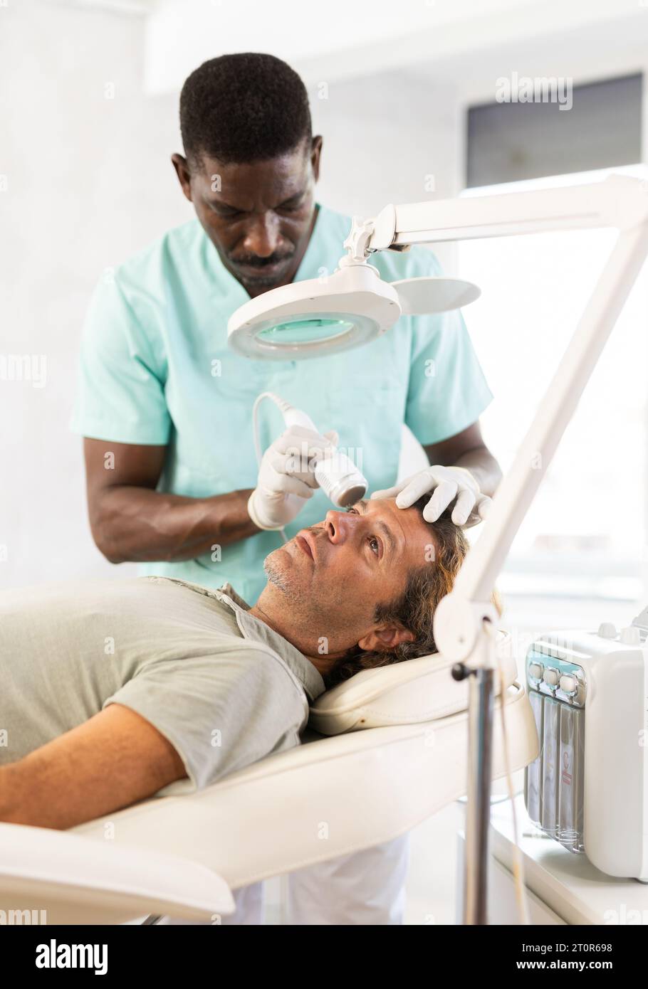 surgeon employs cold hammer Stock Photo - Alamy