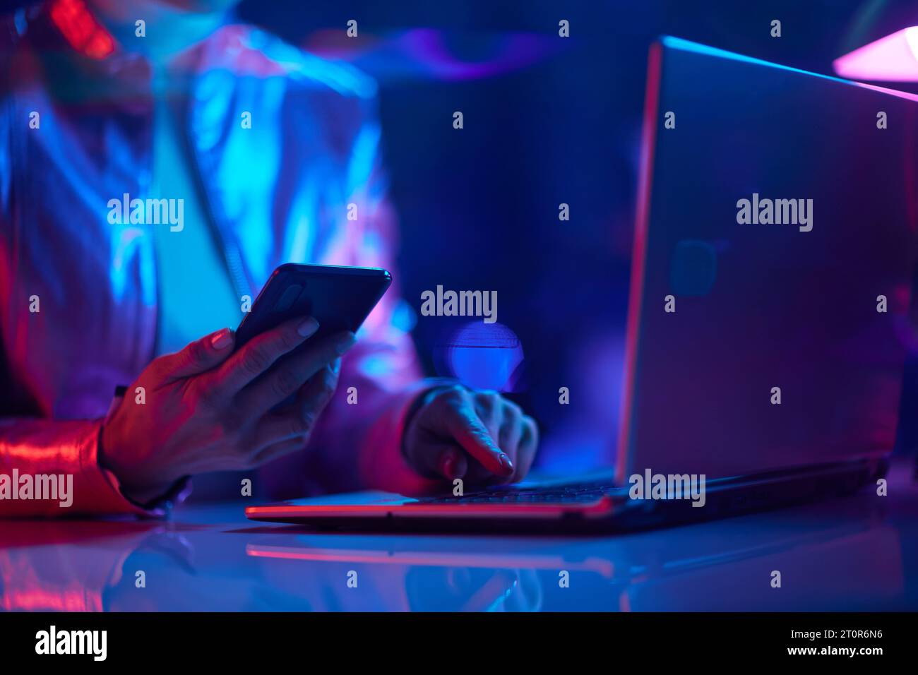 Neon metaverse futuristic concept. Closeup on middle aged woman with ...