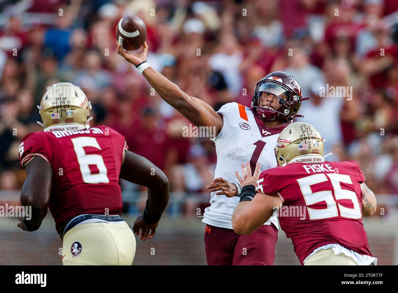 Virginia Tech quarterback Kyron Drones (1) throws under pressure from Florida State defensive ...