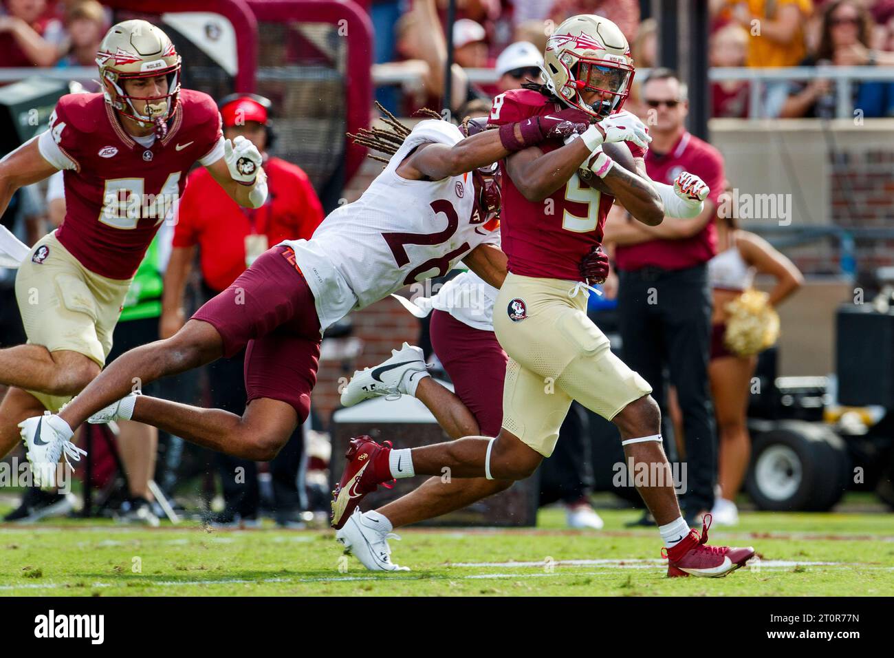 Florida State running back Lawrance Toafili (9) runs away from Virginia ...