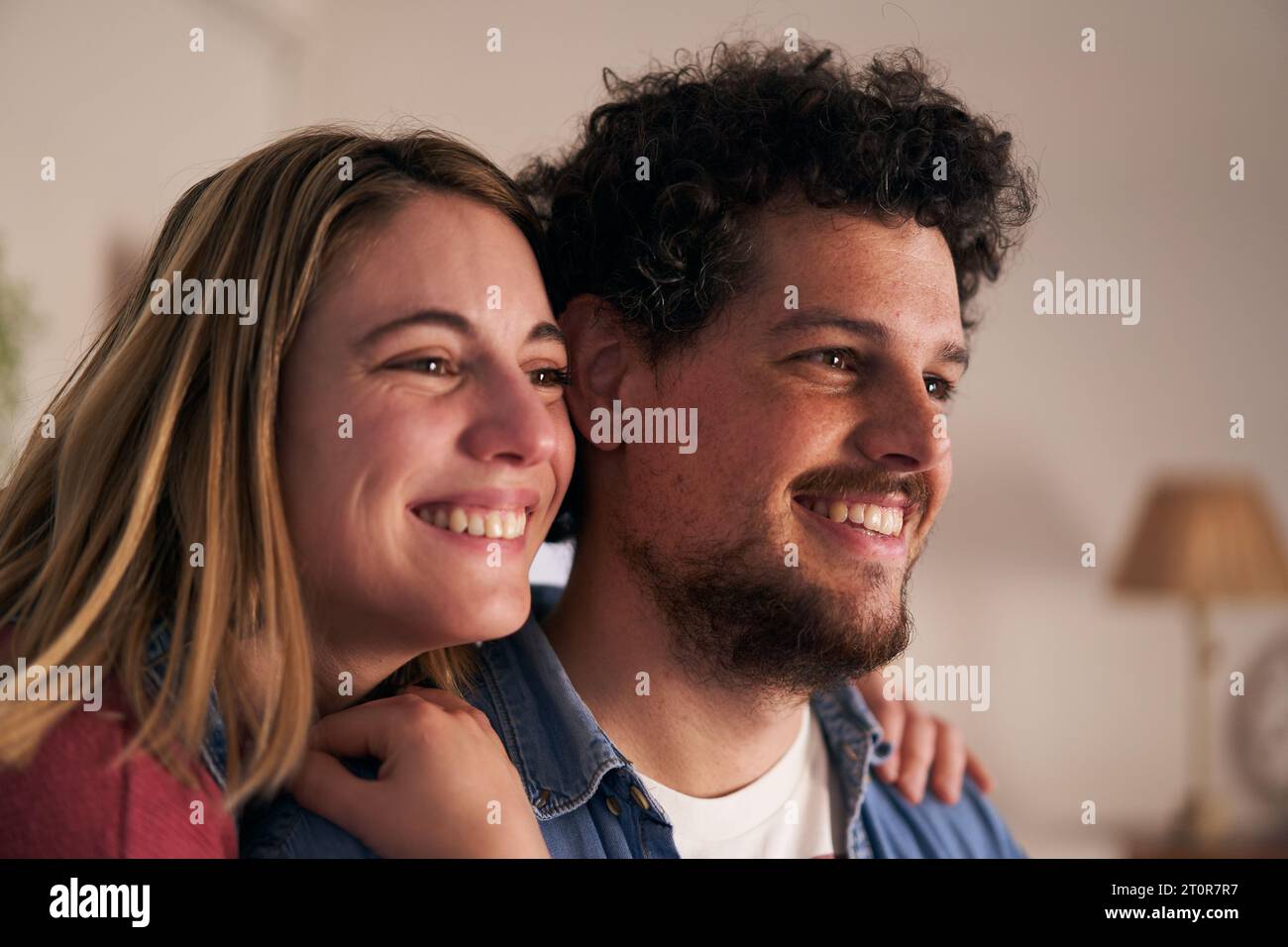 Close up of cheerful faces of young adult Caucasian romantic couple ...