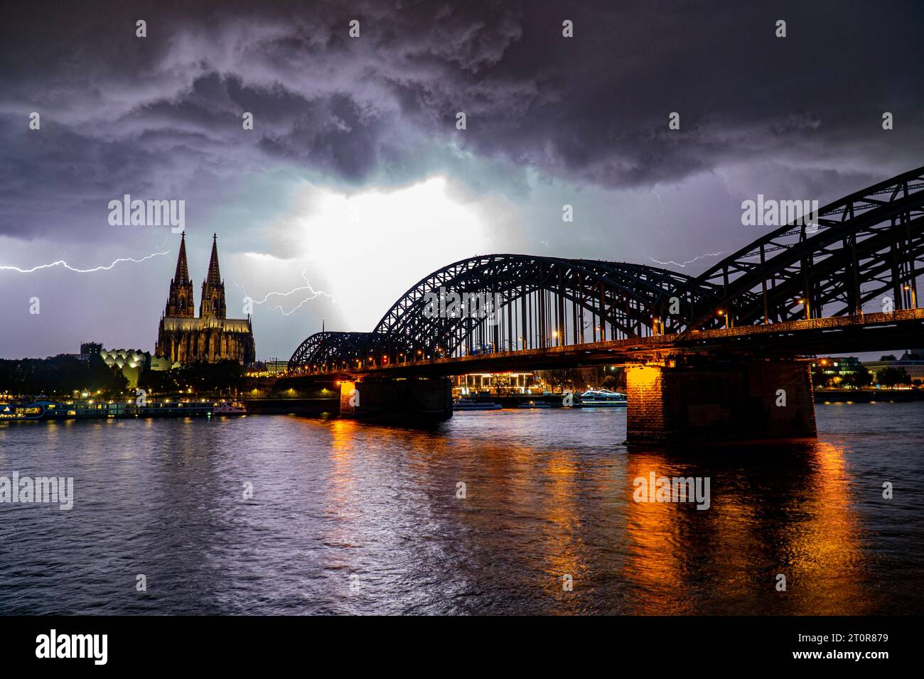 Lightning and dramatic storm clouds over Cologne Cathedral and ...