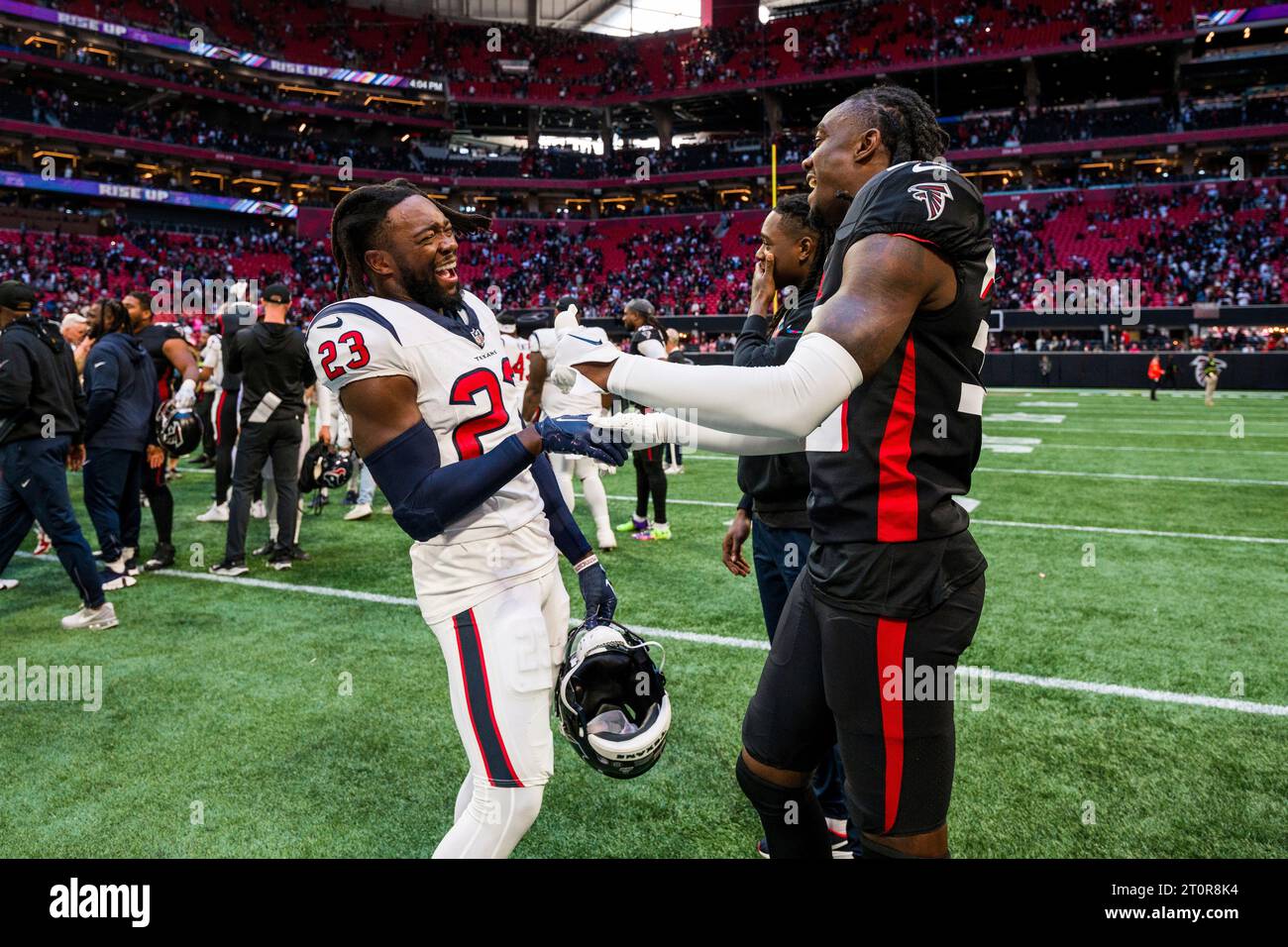 Houston Texans safety Eric Murray (23) talks with Atlanta Falcons ...