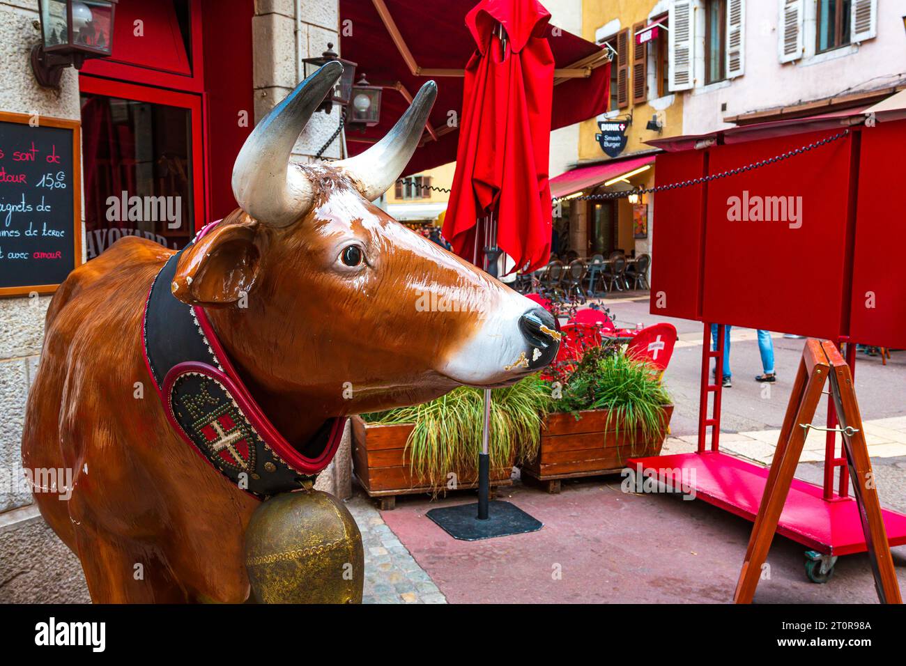 An artificial model of cow in the streets of Annecy, in France Stock ...