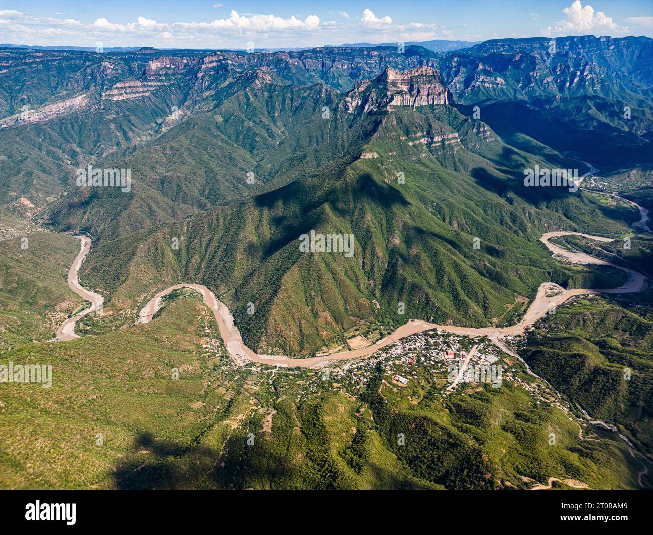 From a drone's eye, the aerial panorama of Urique Canyon within Copper ...