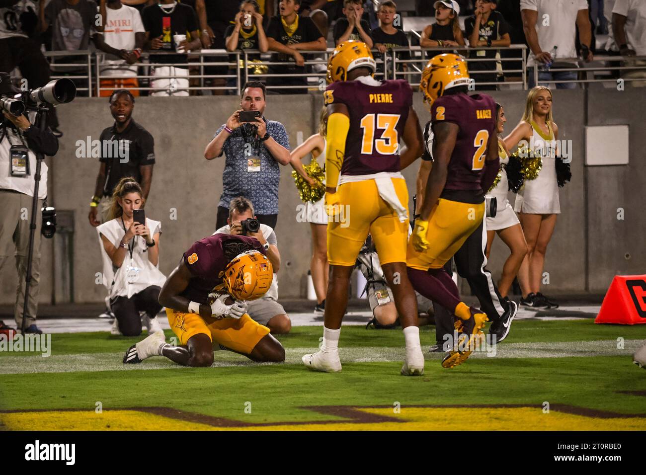 Arizona State Sun Devils wide receiver Troy Omeire (9) scores a ...