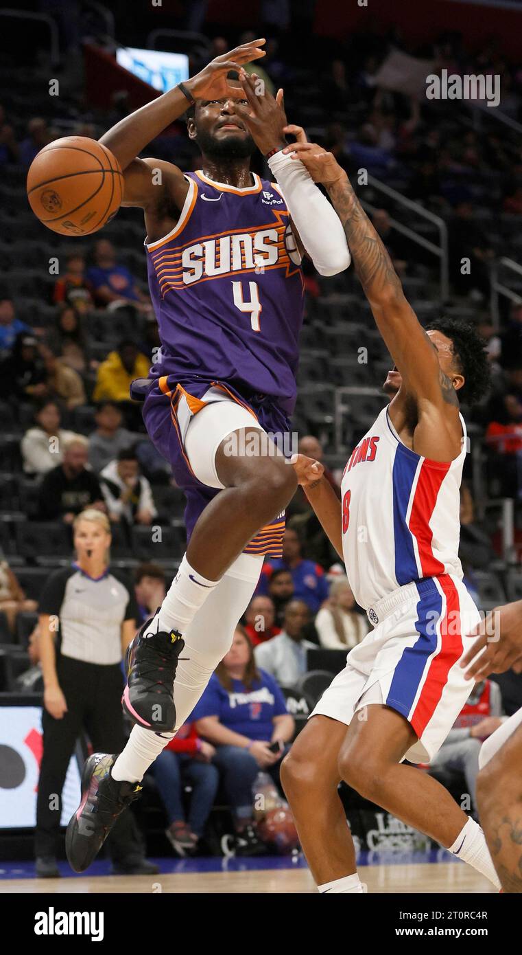 Phoenix Suns forward Chimezie Metu (4) is fouled by Detroit Pistons ...