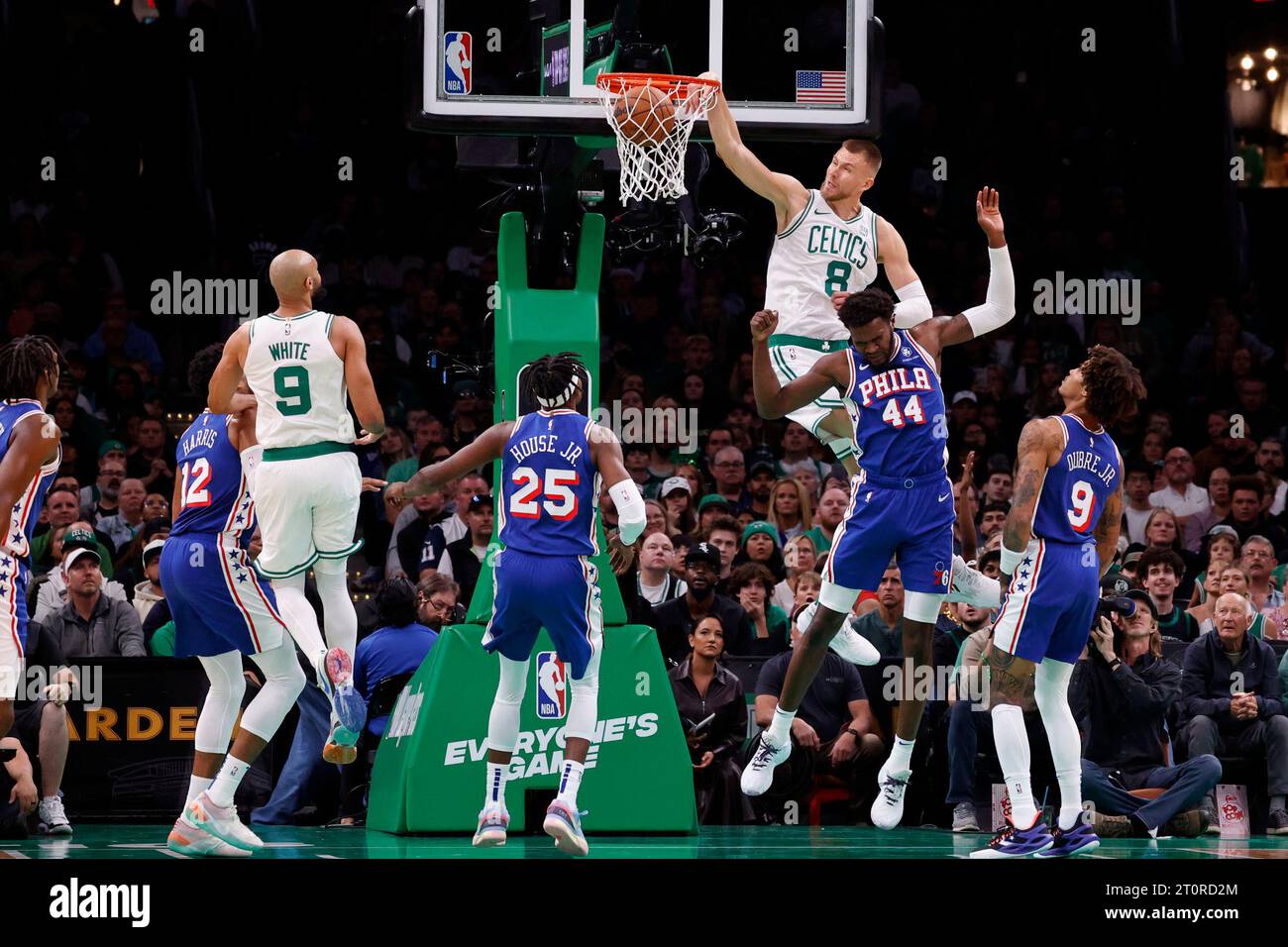 Boston Celtics center Kristaps Porzingis (8) dunks over Philadelphia ...